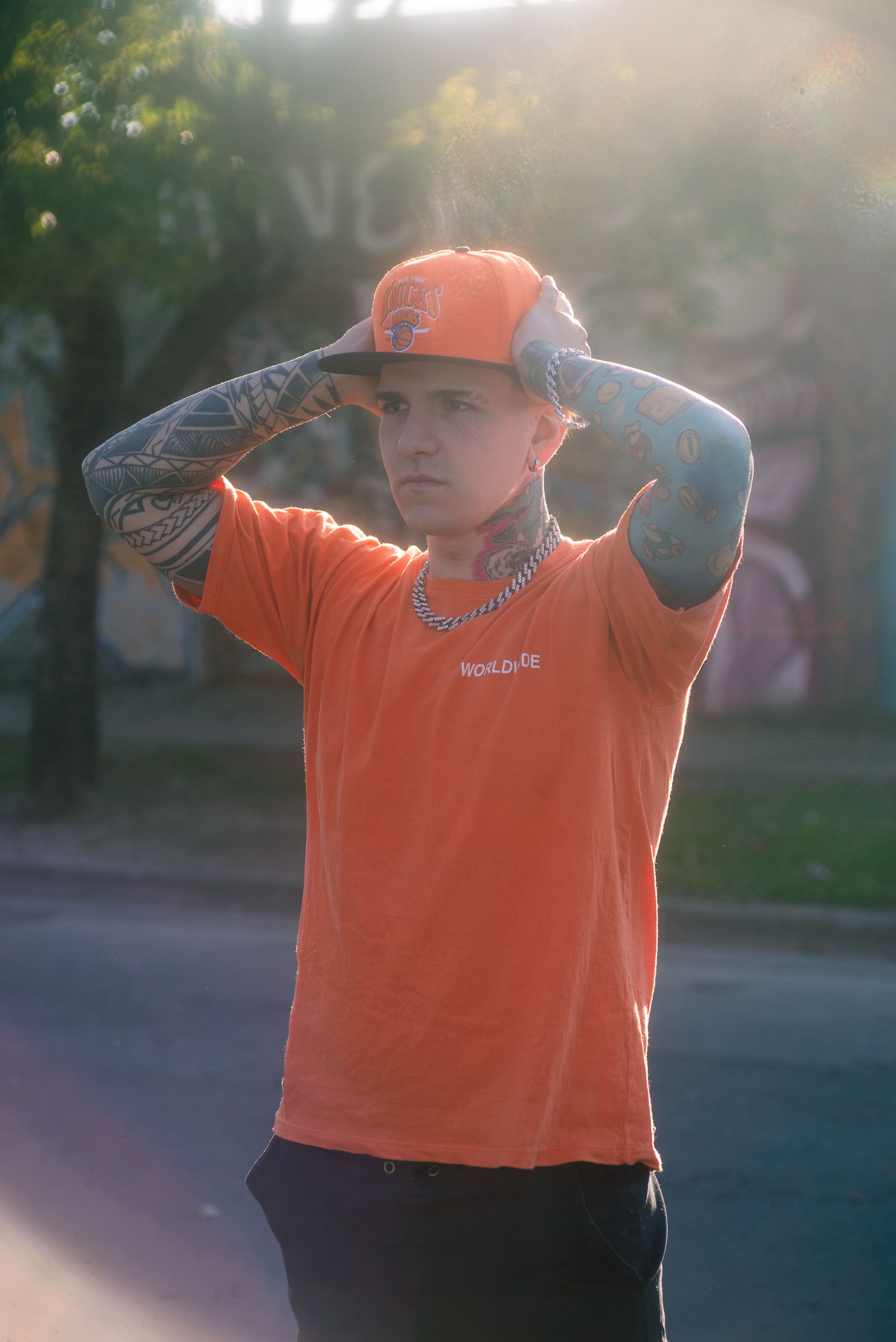 Urban Streetwear Fashion with Bold Tattoos · Free Stock Photo