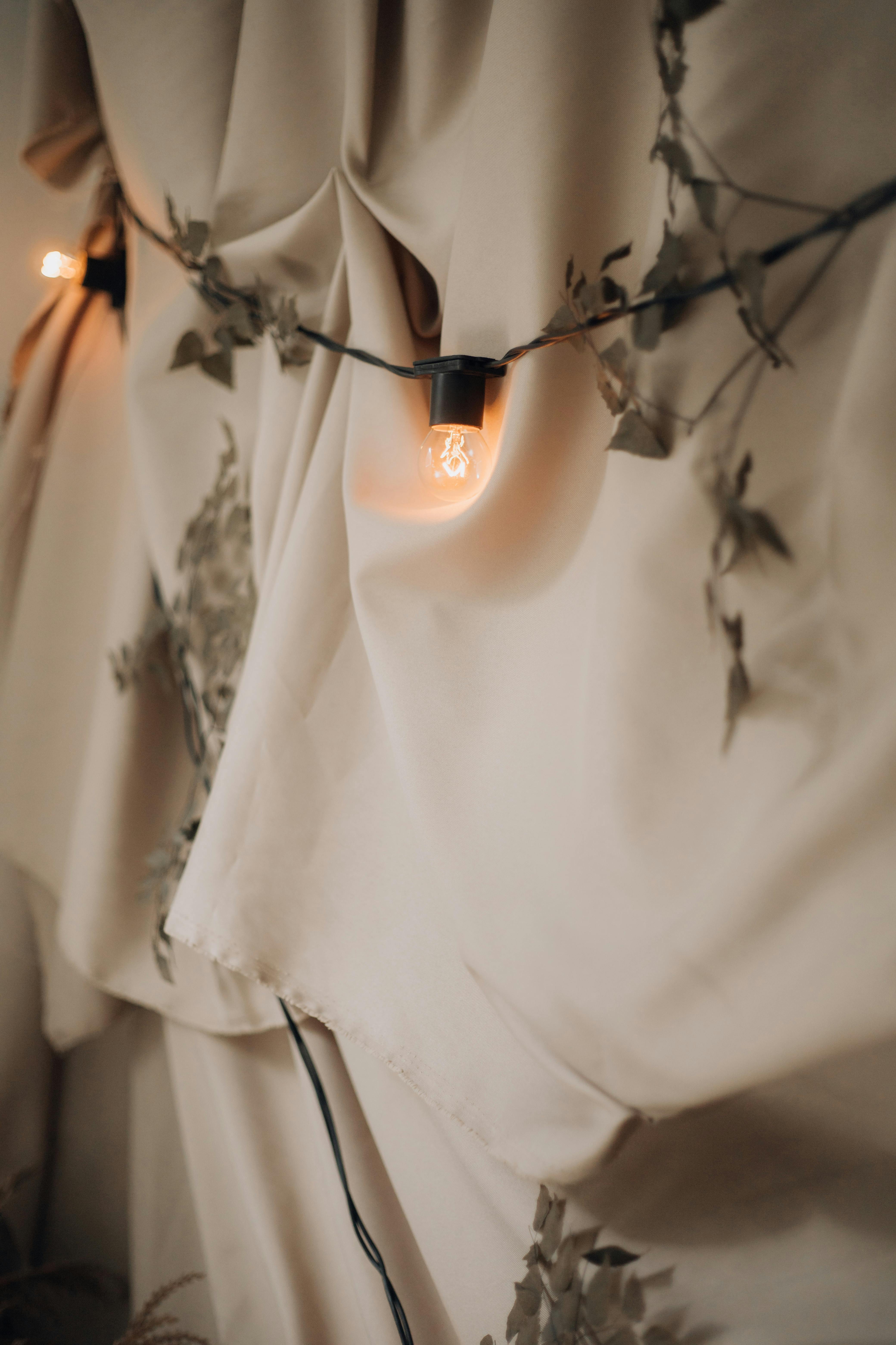 Cozy String Lights with Draped Fabric Decor · Free Stock Photo