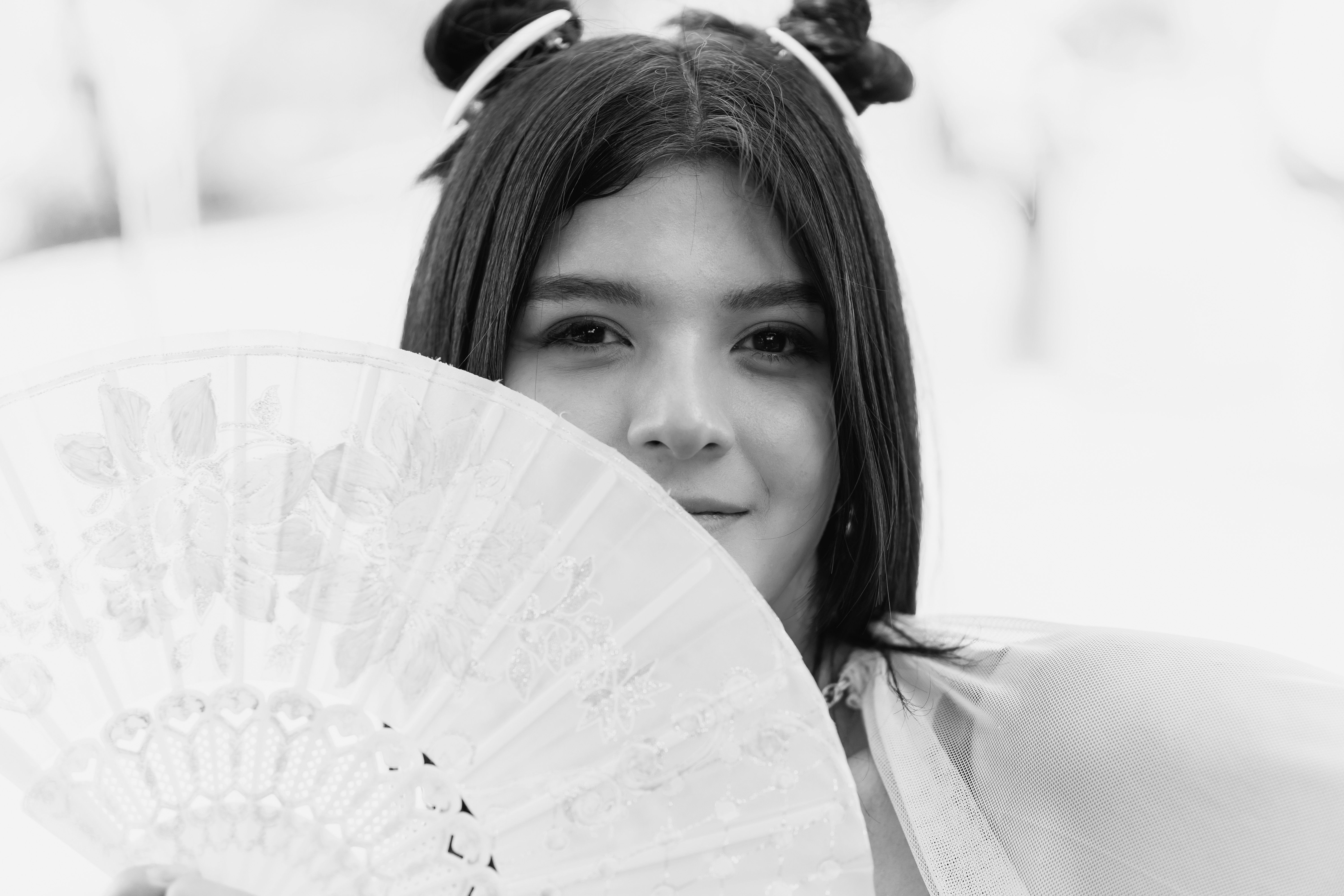 Elegant Portrait of Woman with Fan · Free Stock Photo