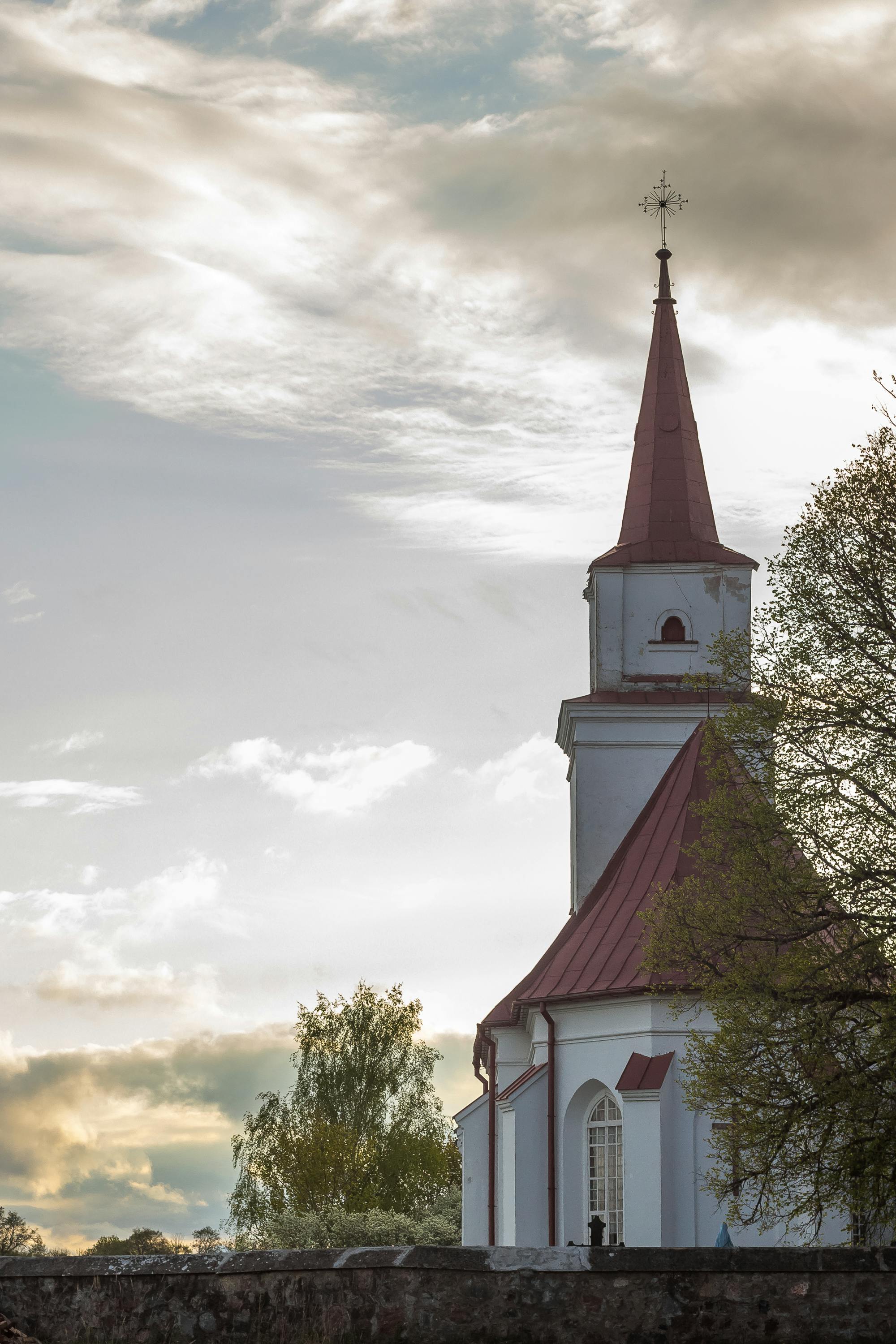 Majestic Church Steeple Amidst Springtime Trees · Free Stock Photo