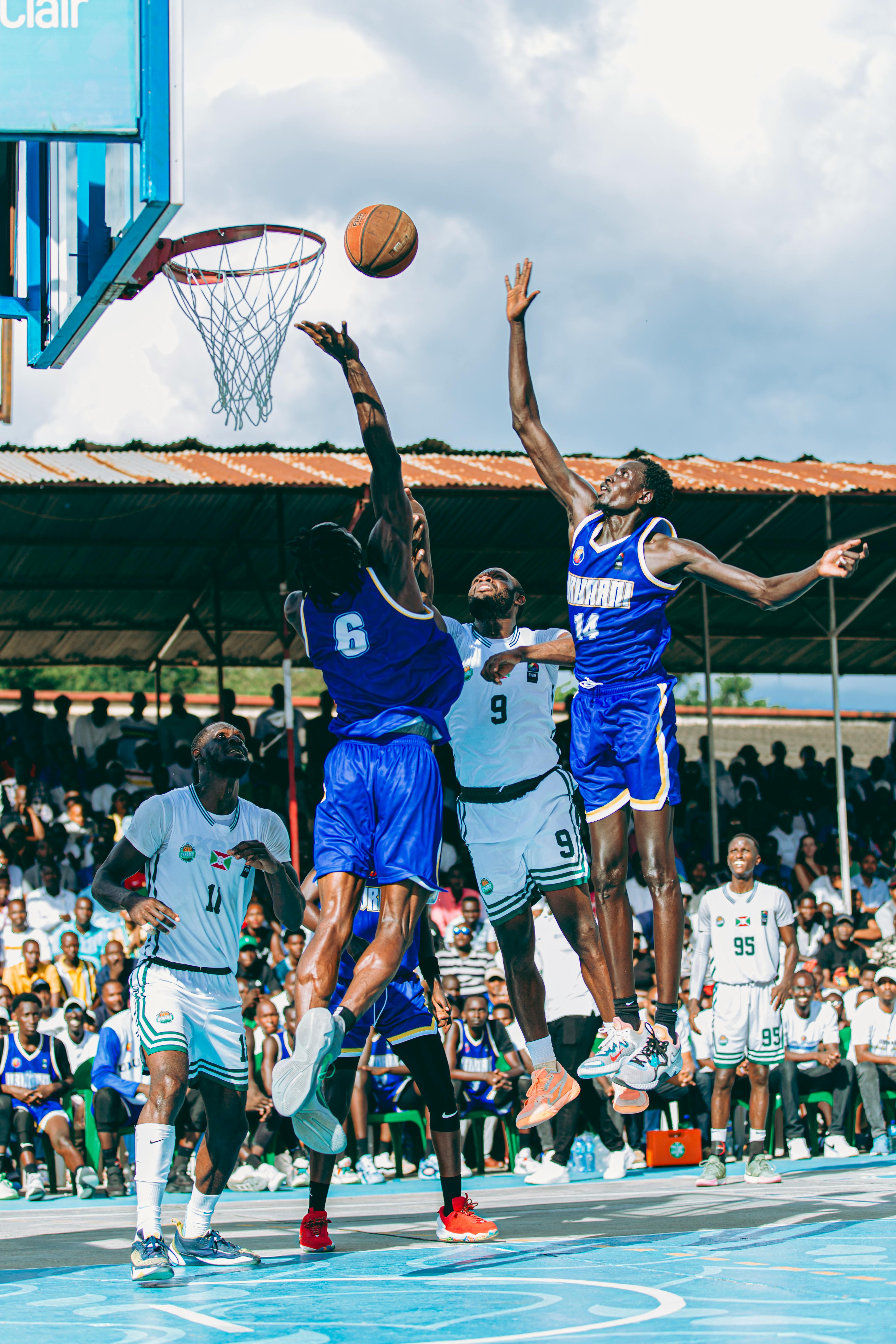 Exciting Outdoor Basketball Game Action · Free Stock Photo