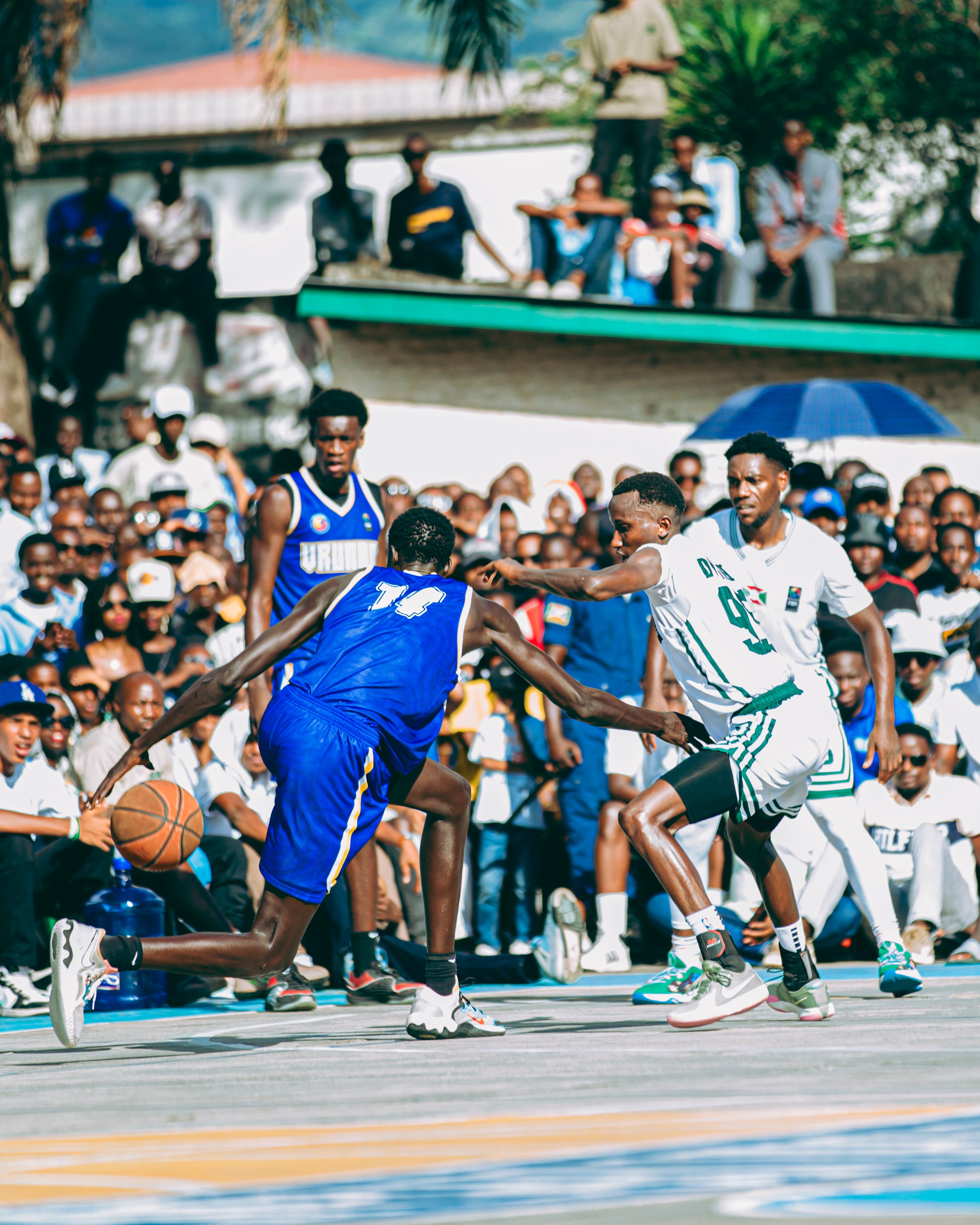 Intense Outdoor Basketball Game with Crowd · Free Stock Photo