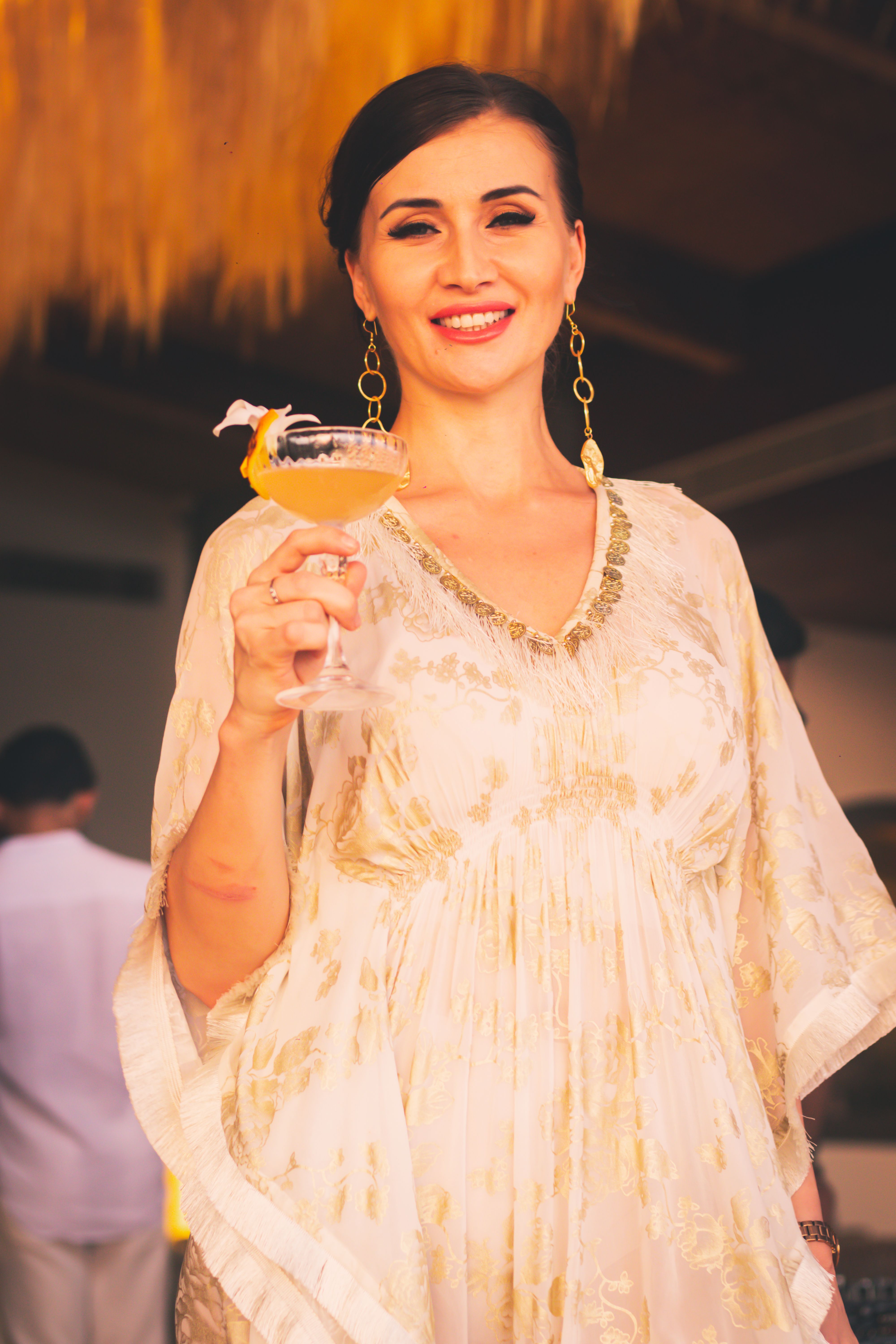Elegant Woman Enjoying an Evening Cocktail at an Indian Event · Free ...