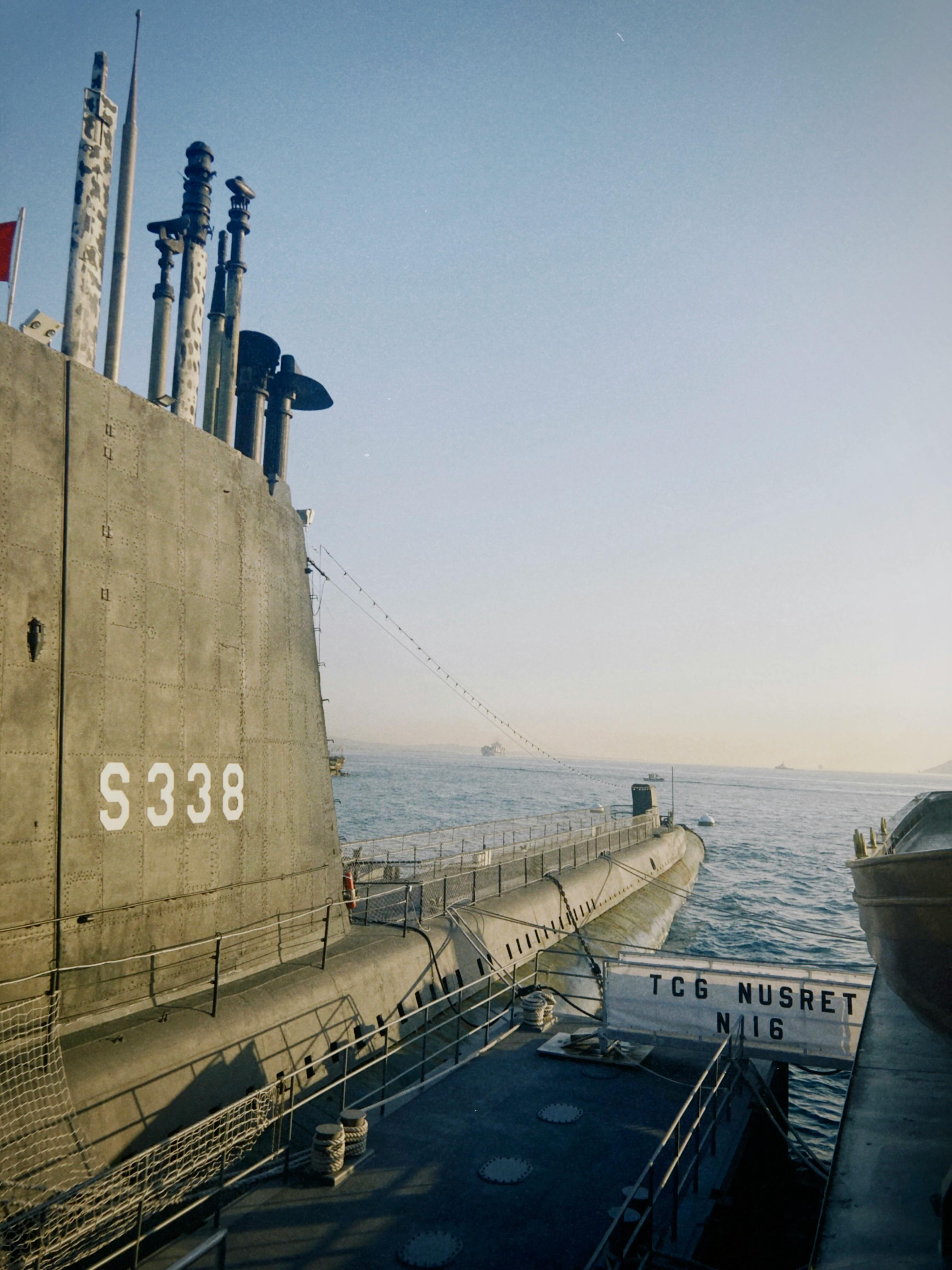 Military Submarine Moored on a Calm Water · Free Stock Photo