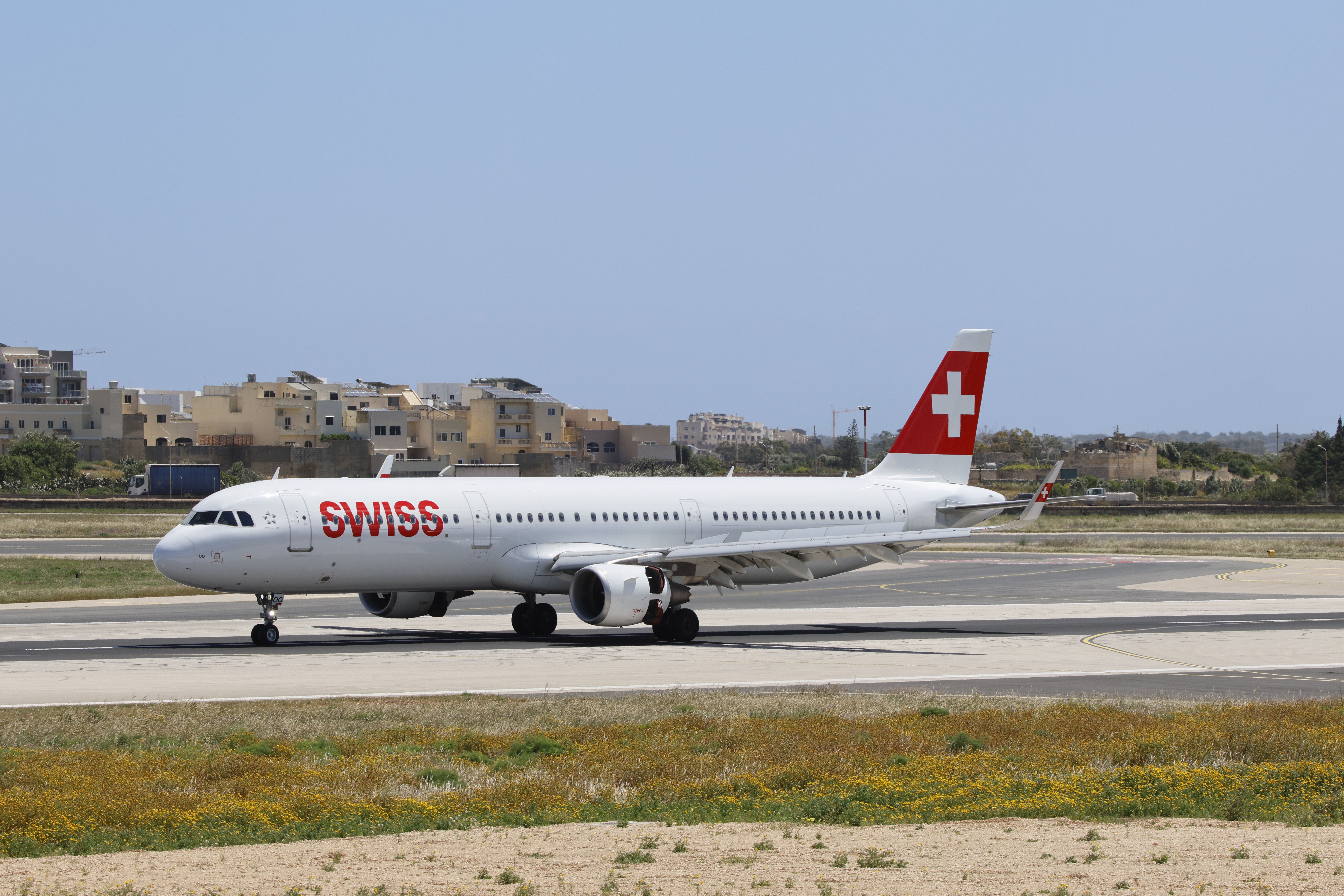 Swiss Airline Airbus A321 on Airport Runway · Free Stock Photo