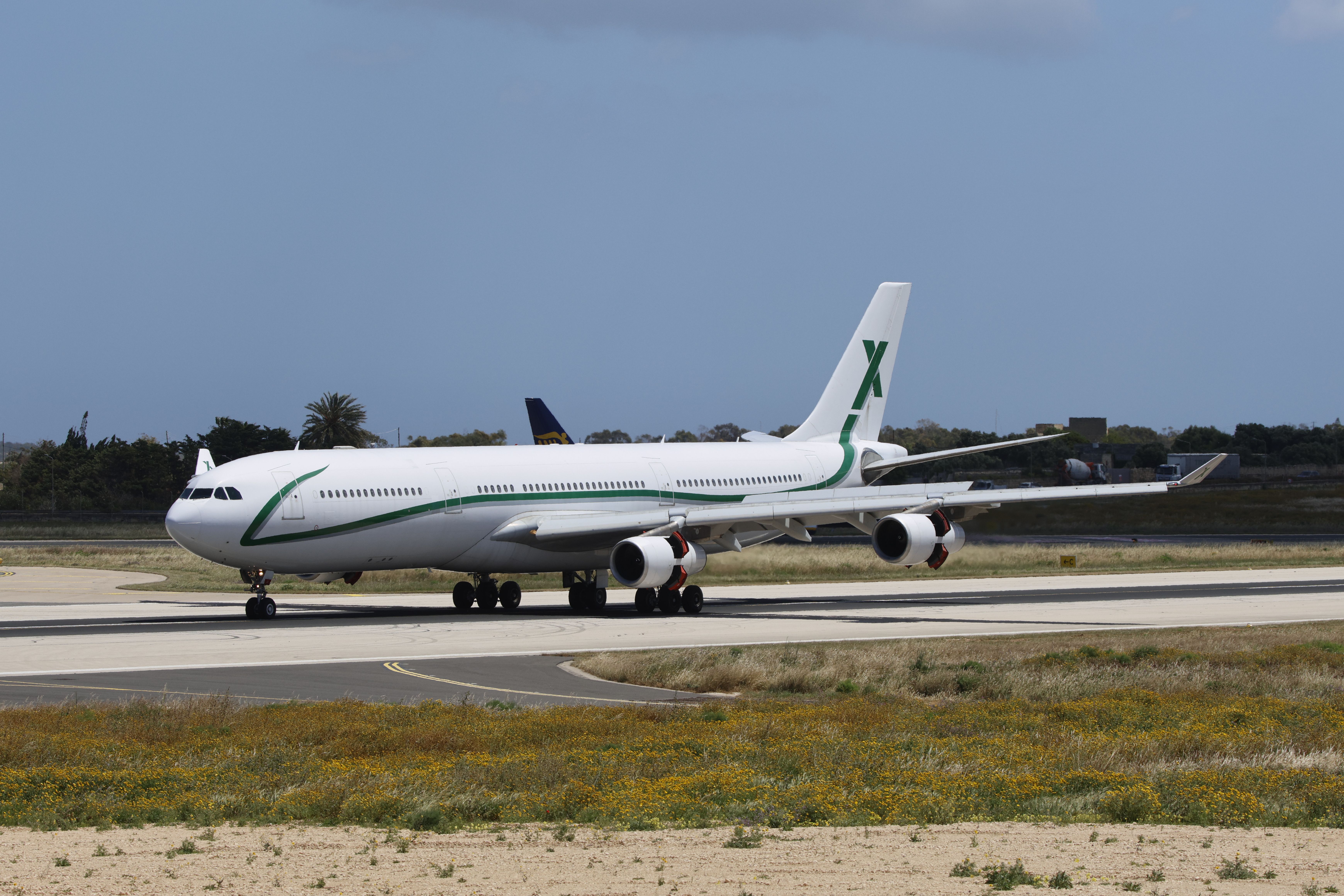 Large Aircraft Taxiing on Runway at Airport · Free Stock Photo