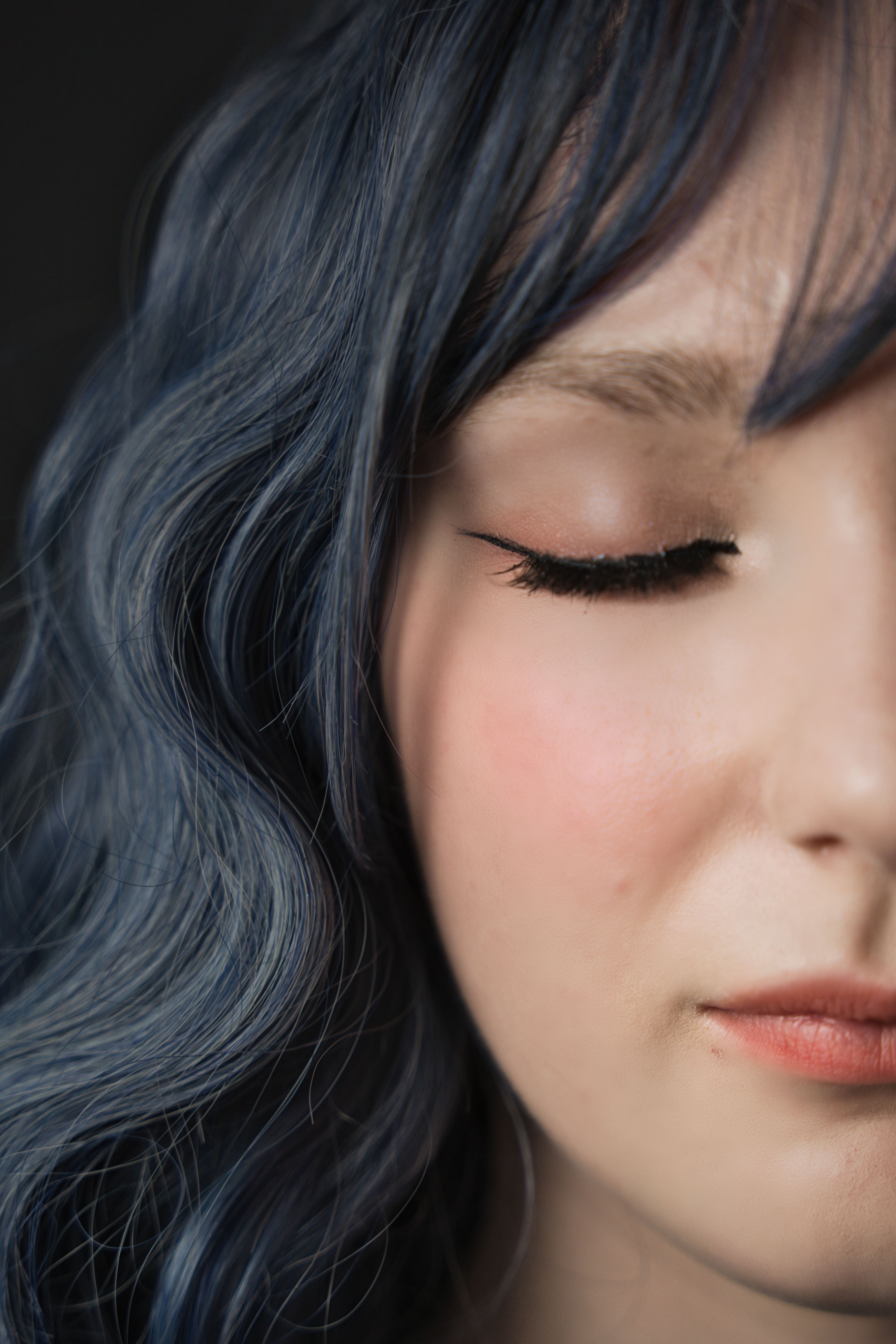 Elegant Female Portrait with Blue Hair in Studio · Free Stock Photo