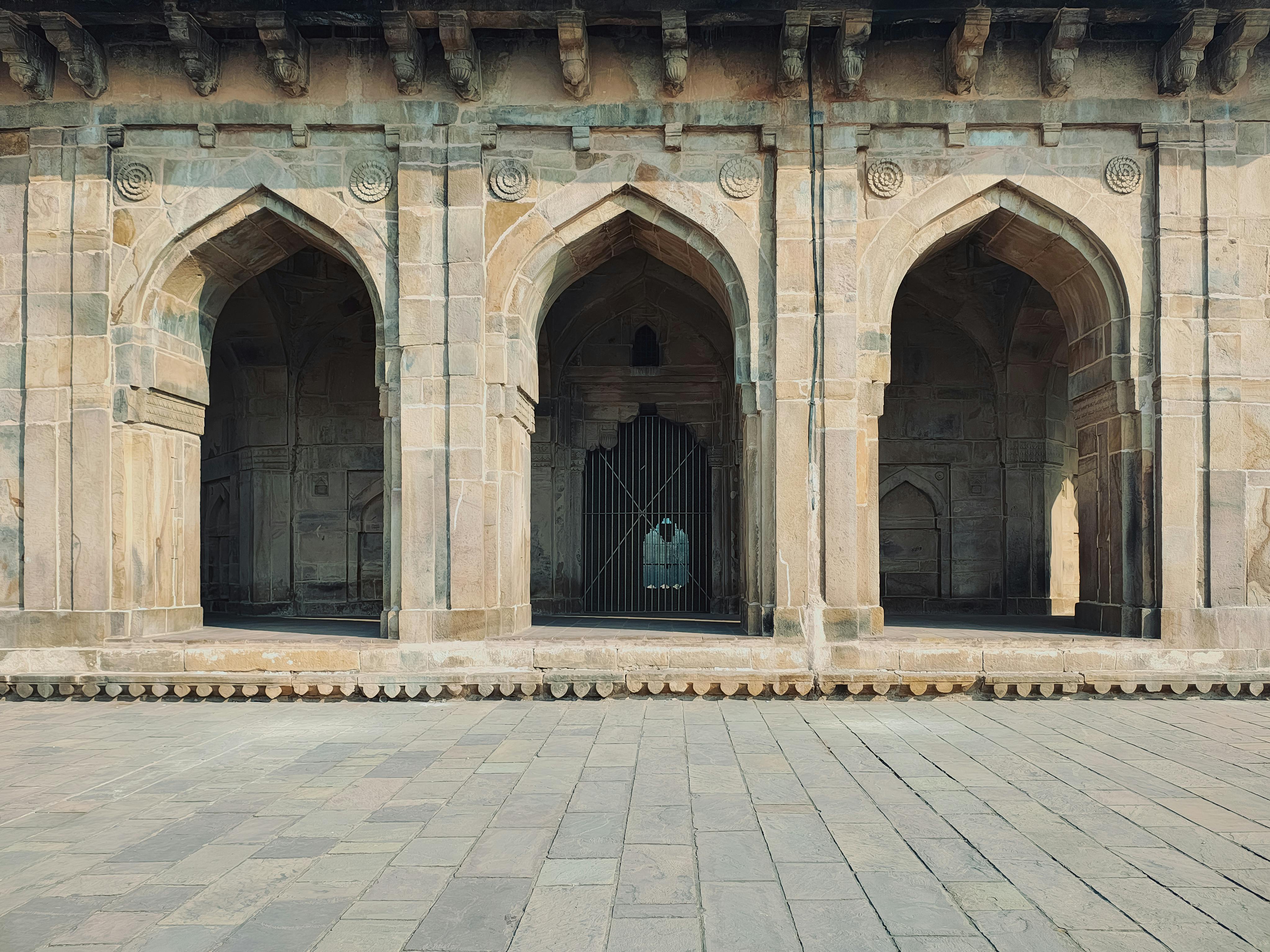 Historic Architectural Structure with Arches · Free Stock Photo