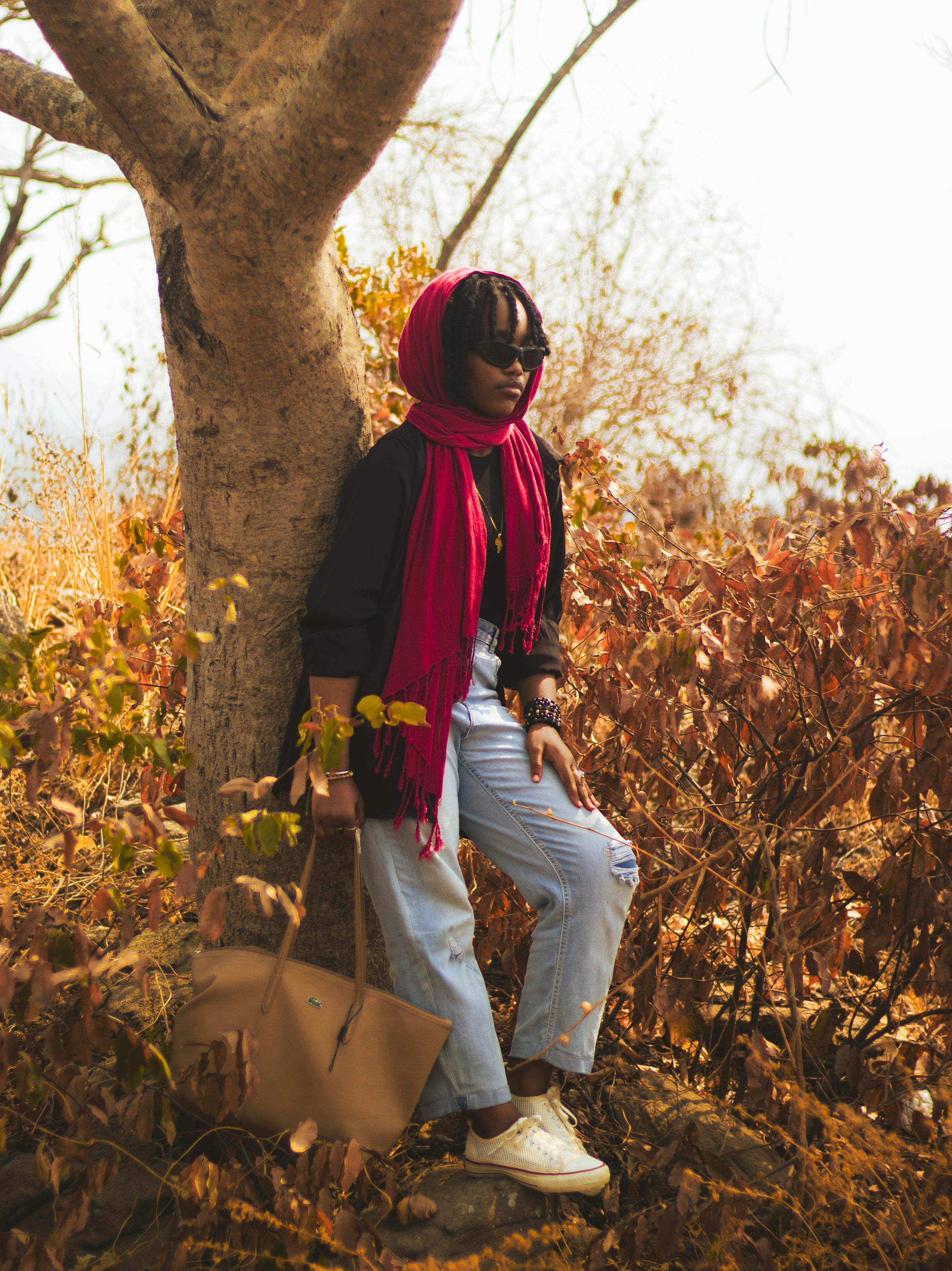 Stylish Woman Posing in Autumn Forest Landscape · Free Stock Photo