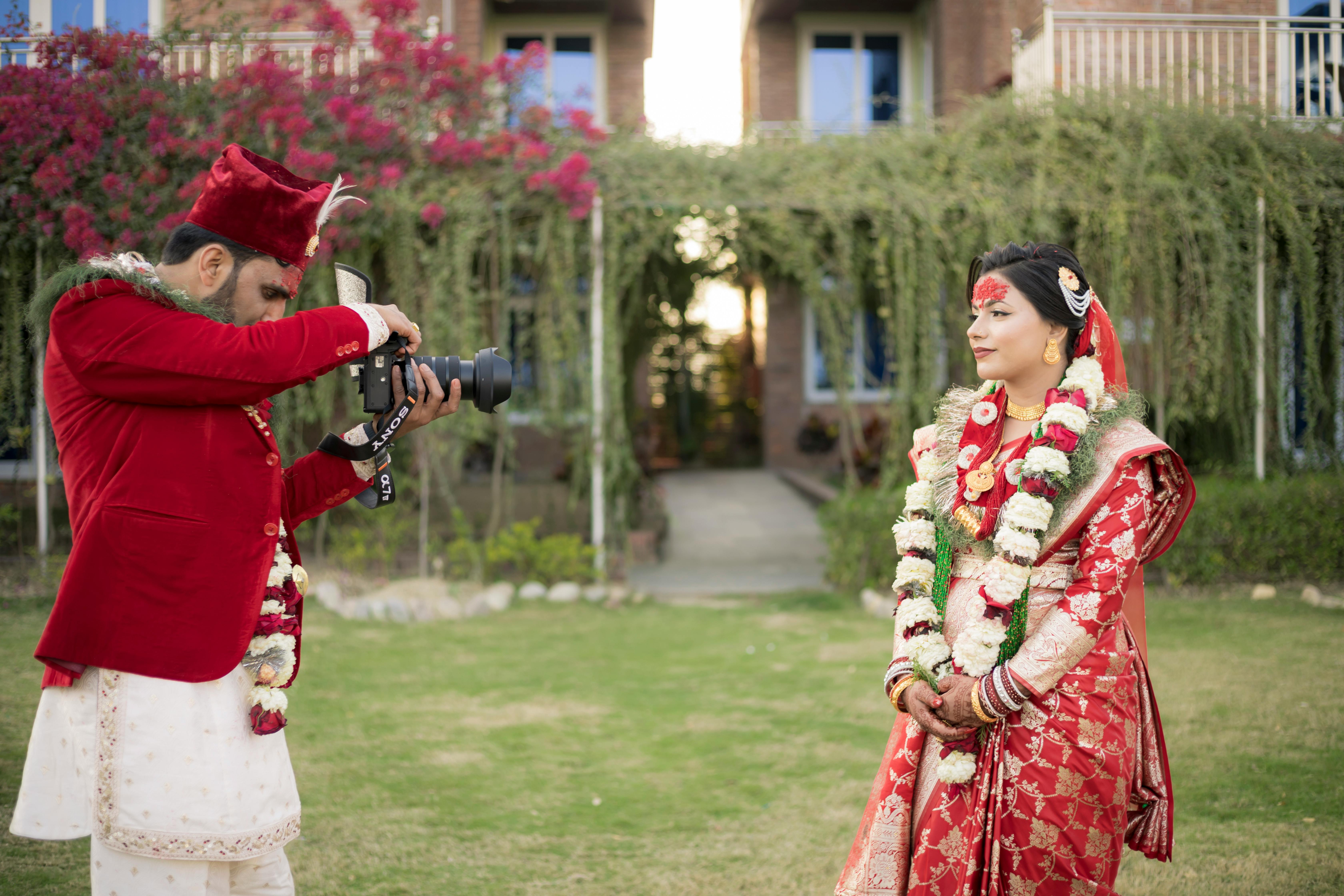 Traditional Nepali Wedding Photographer Capturing Bride · Free Stock Photo