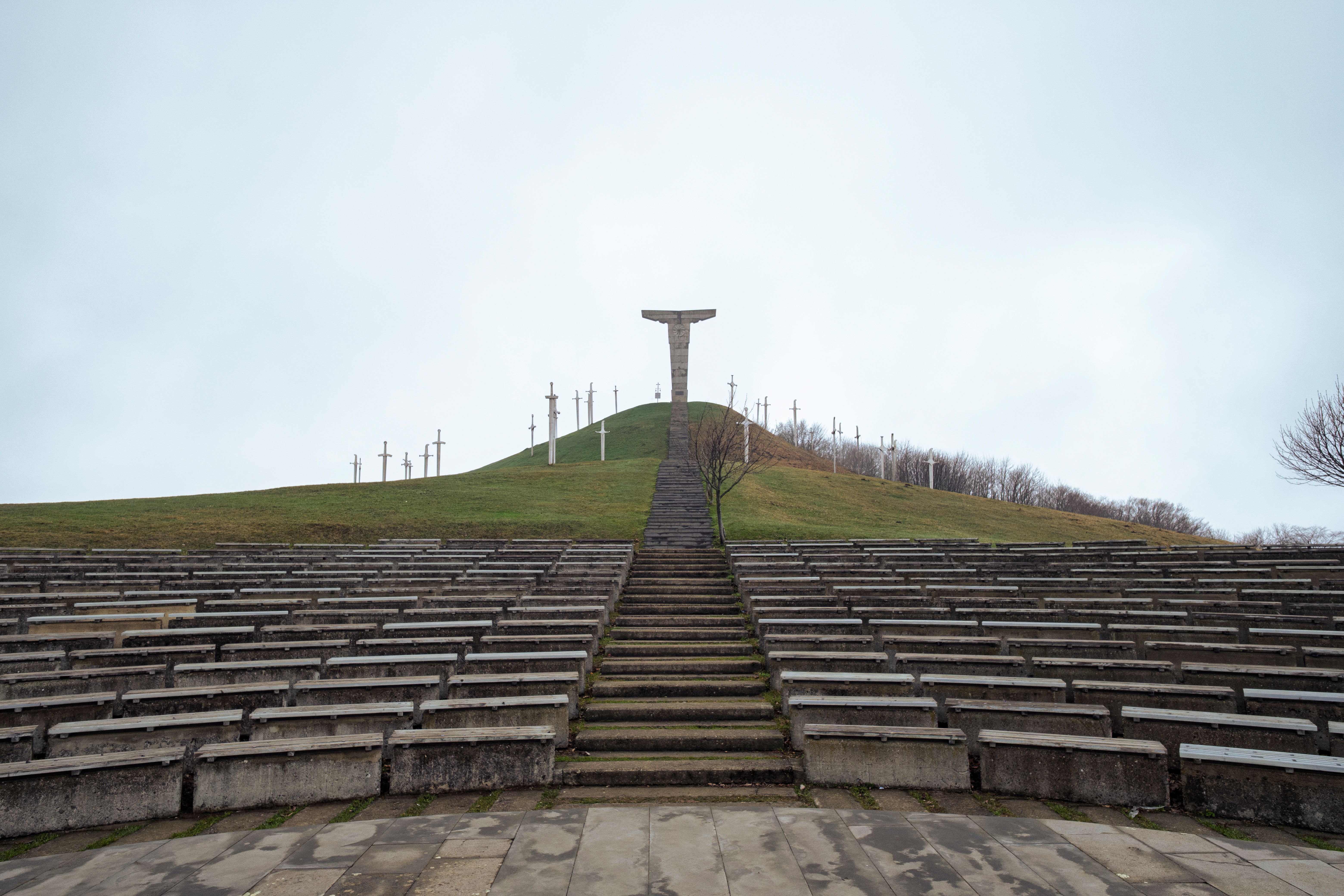 Scenic Amphitheater on Hill with Christian Crosses · Free Stock Photo