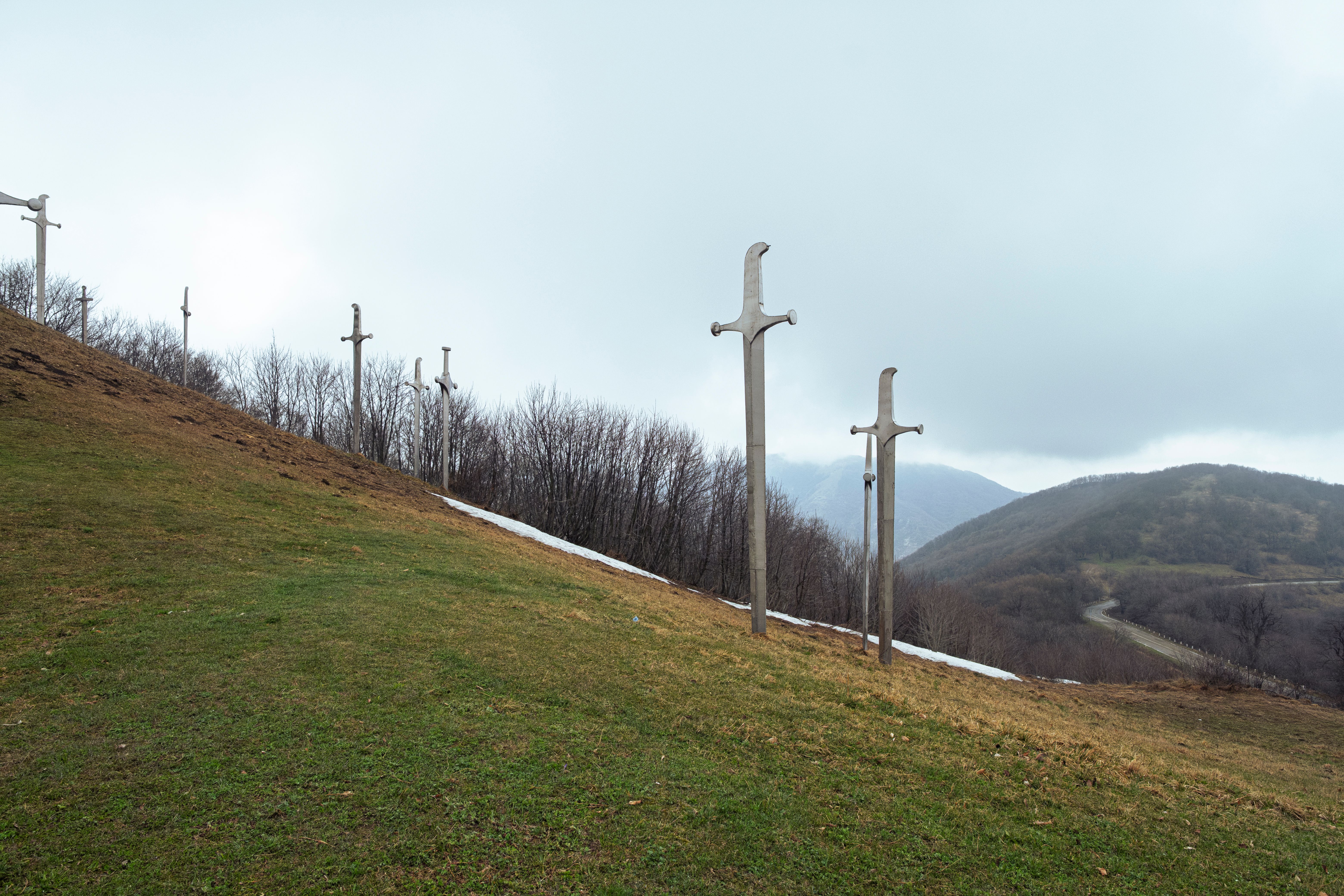 Scenic View of Sword Monuments in Georgian Hills · Free Stock Photo