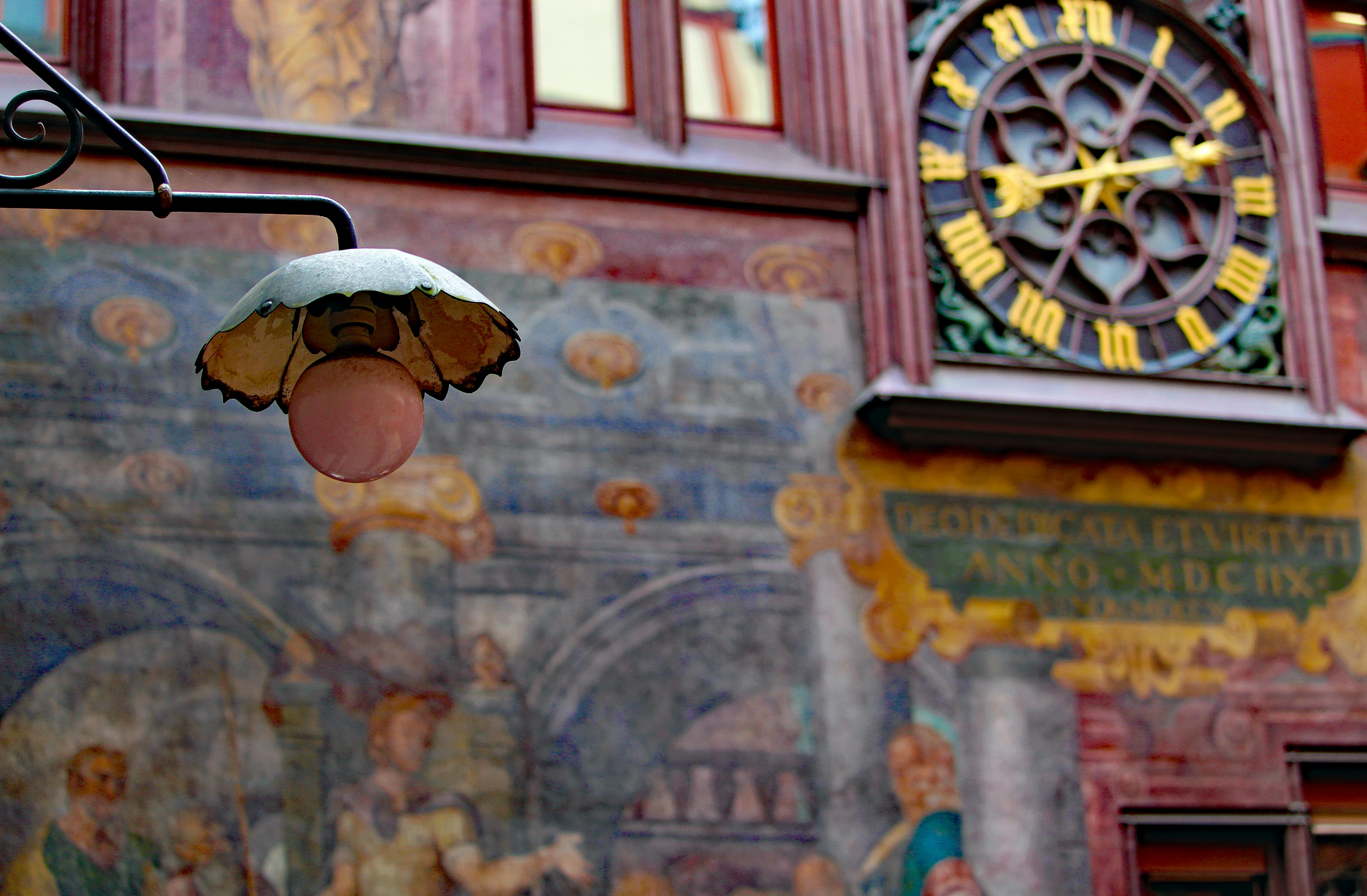 Historic Basel Building with Clock and Mural · Free Stock Photo