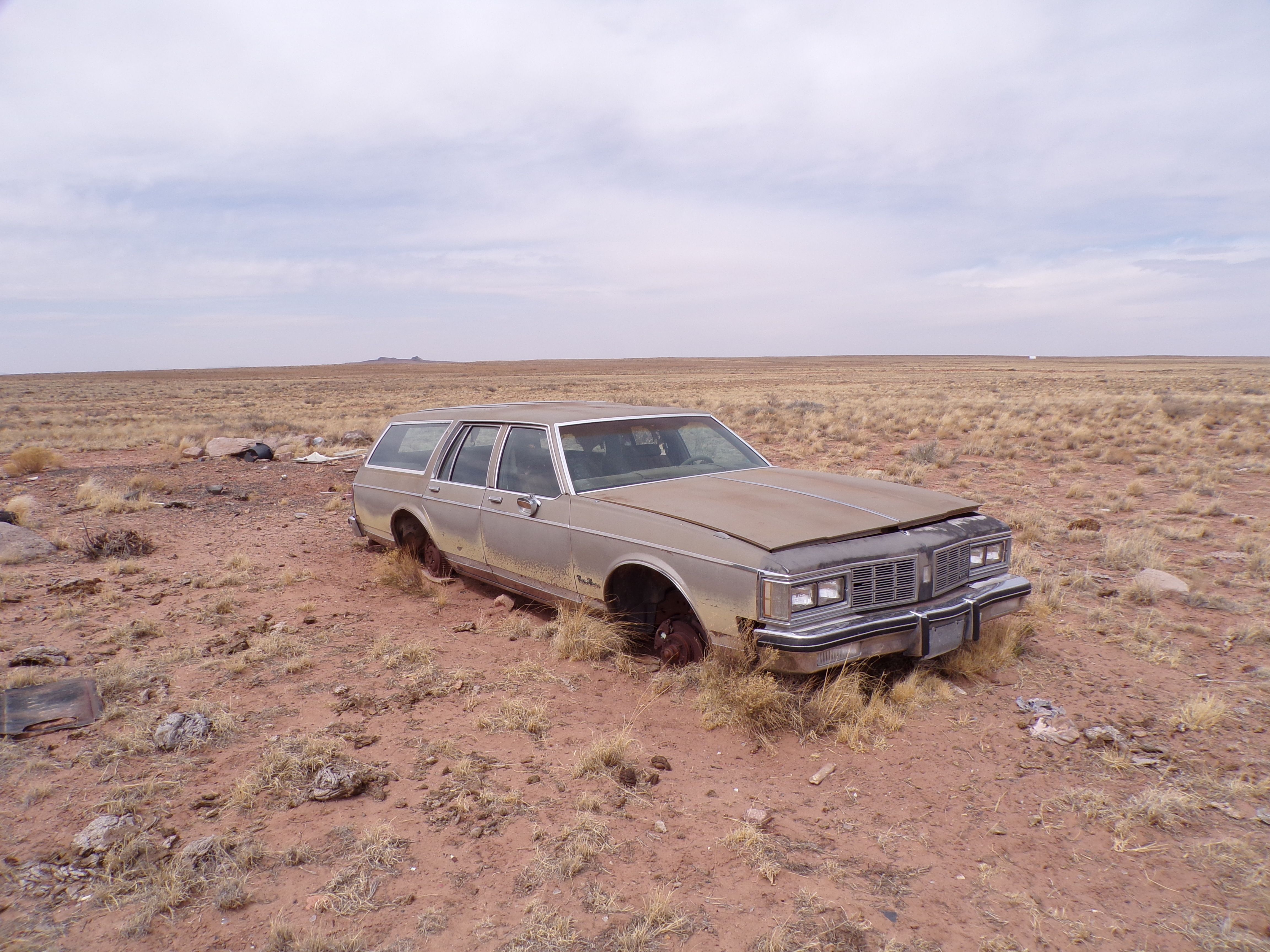 Abandoned Car in Arizona Desert Landscape · Free Stock Photo