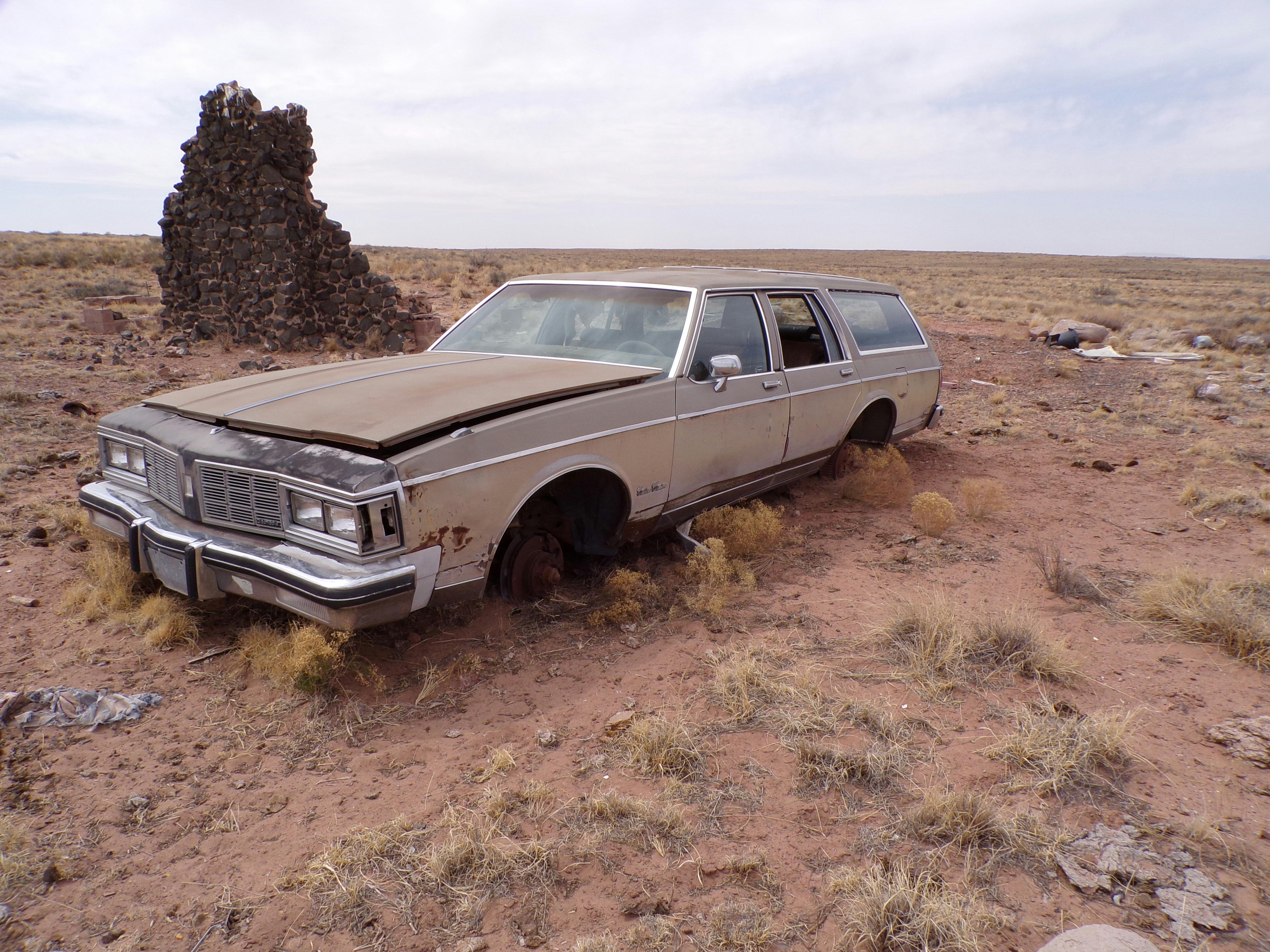 Abandoned Car in Arizona Desert Landscape · Free Stock Photo