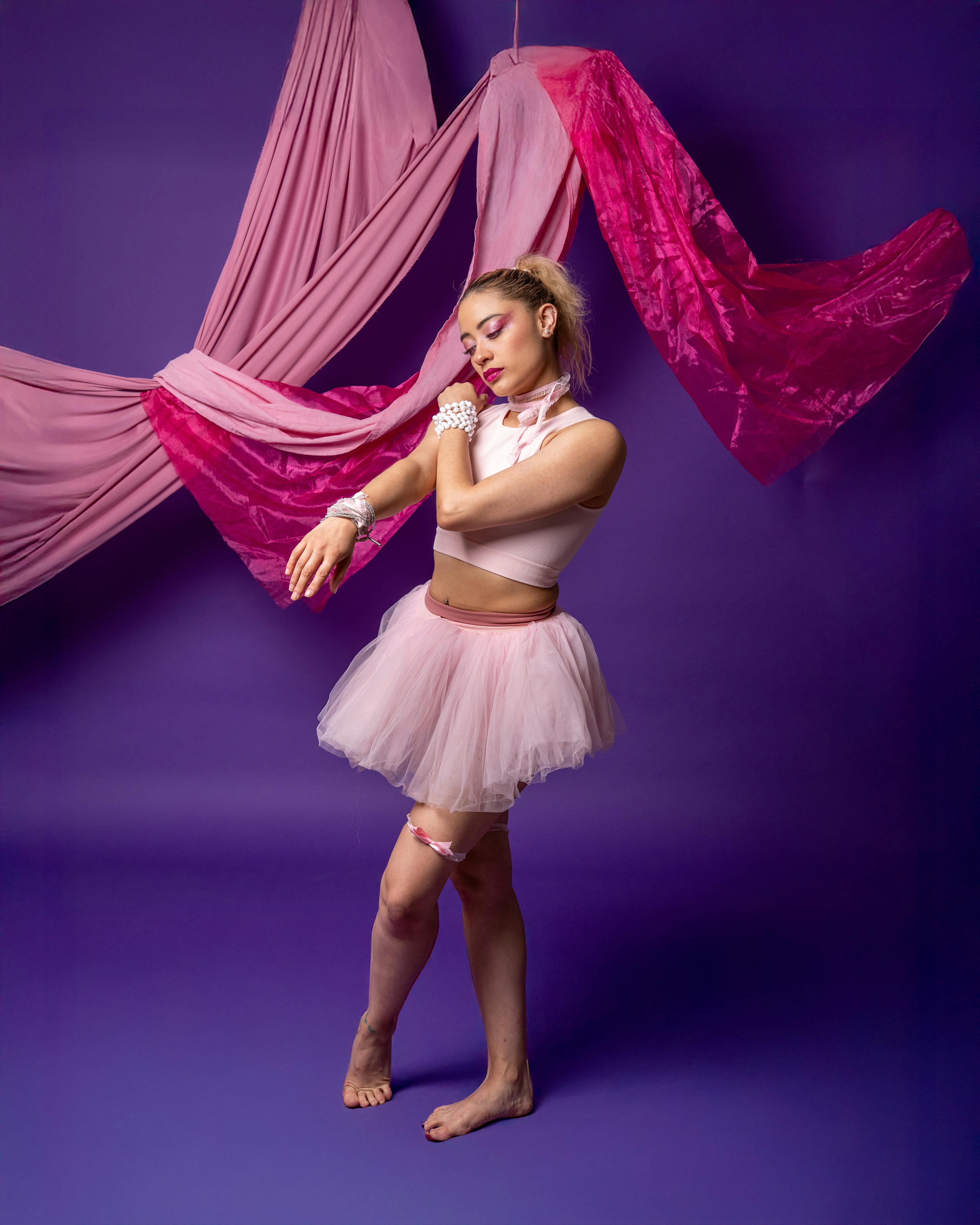 Elegant Contemporary Dance Pose with Pink Drapes · Free Stock Photo