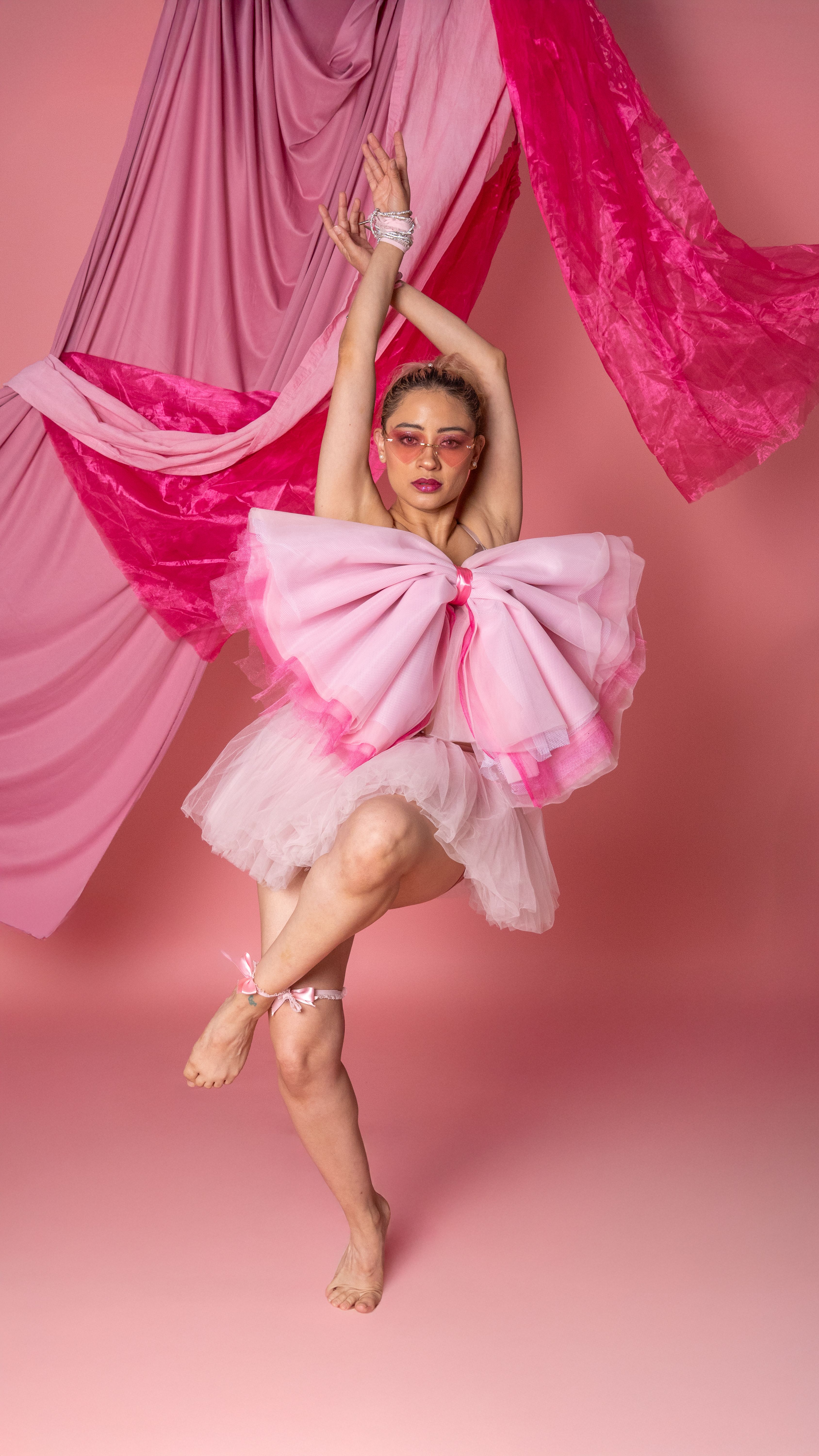 Elegant Contemporary Dancer in Pink Artistic Setting · Free Stock Photo