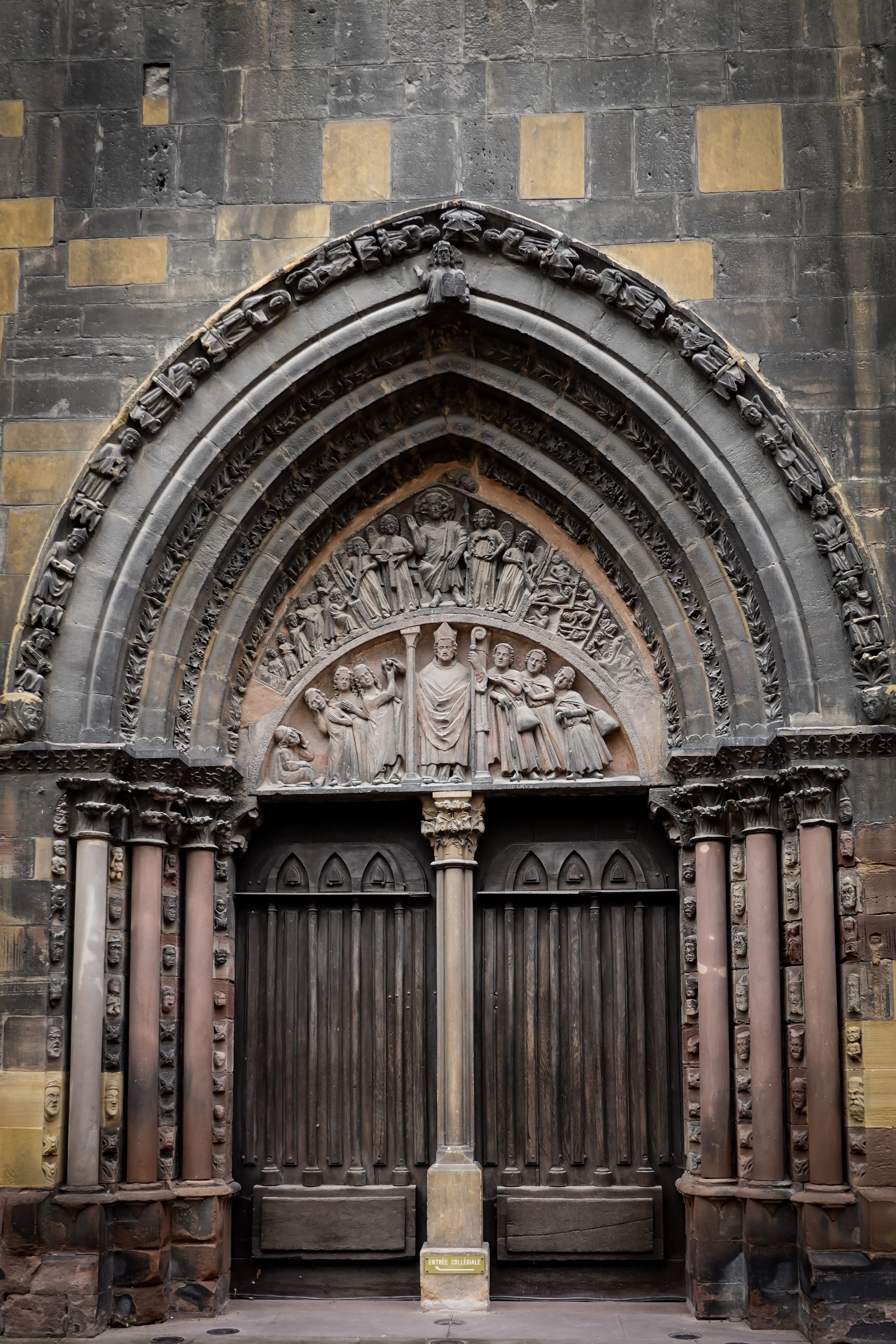 Gothic Cathedral Door with Intricate Stone Carvings · Free Stock Photo