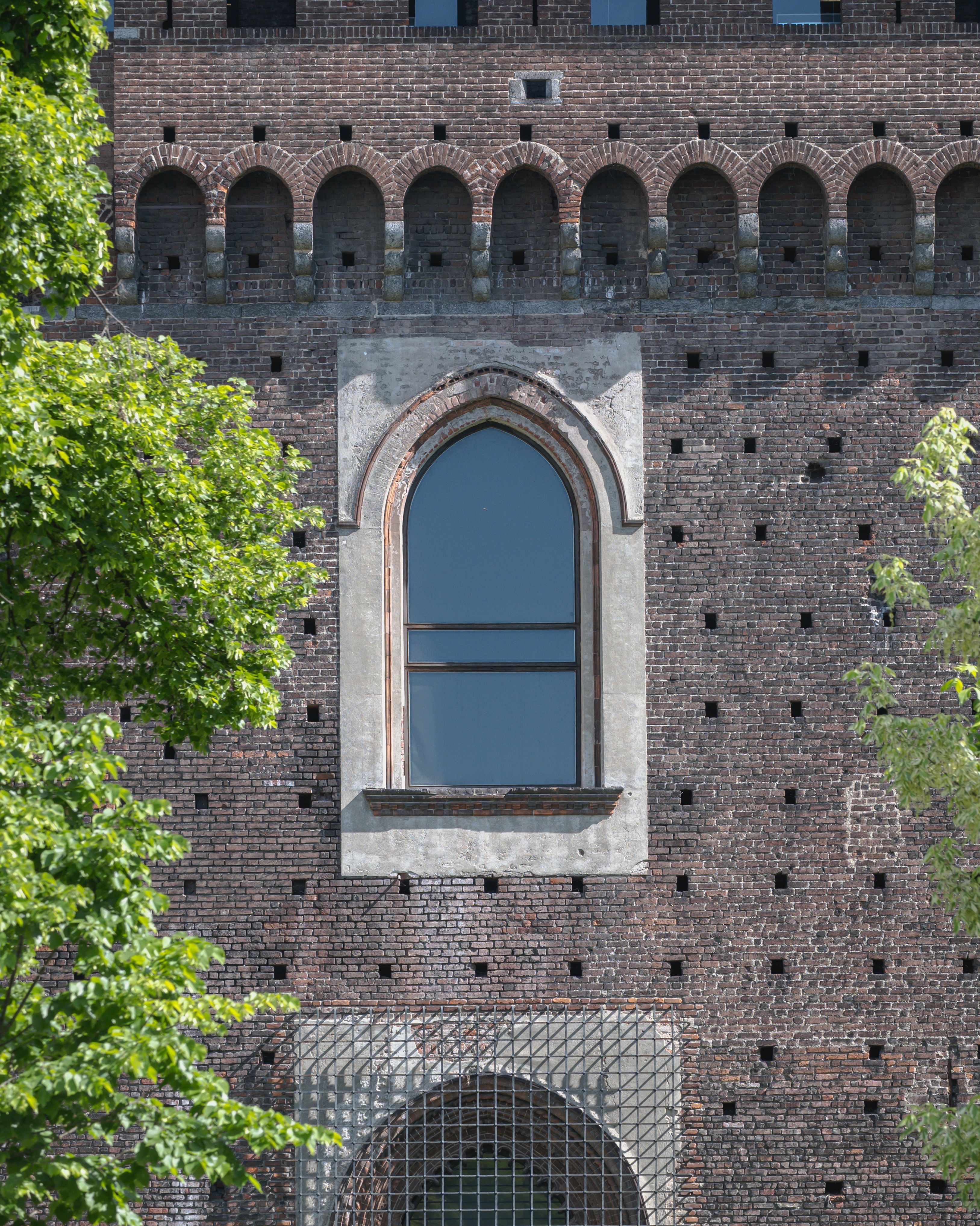Medieval Window and Arched Gate at Sforza Castle · Free Stock Photo