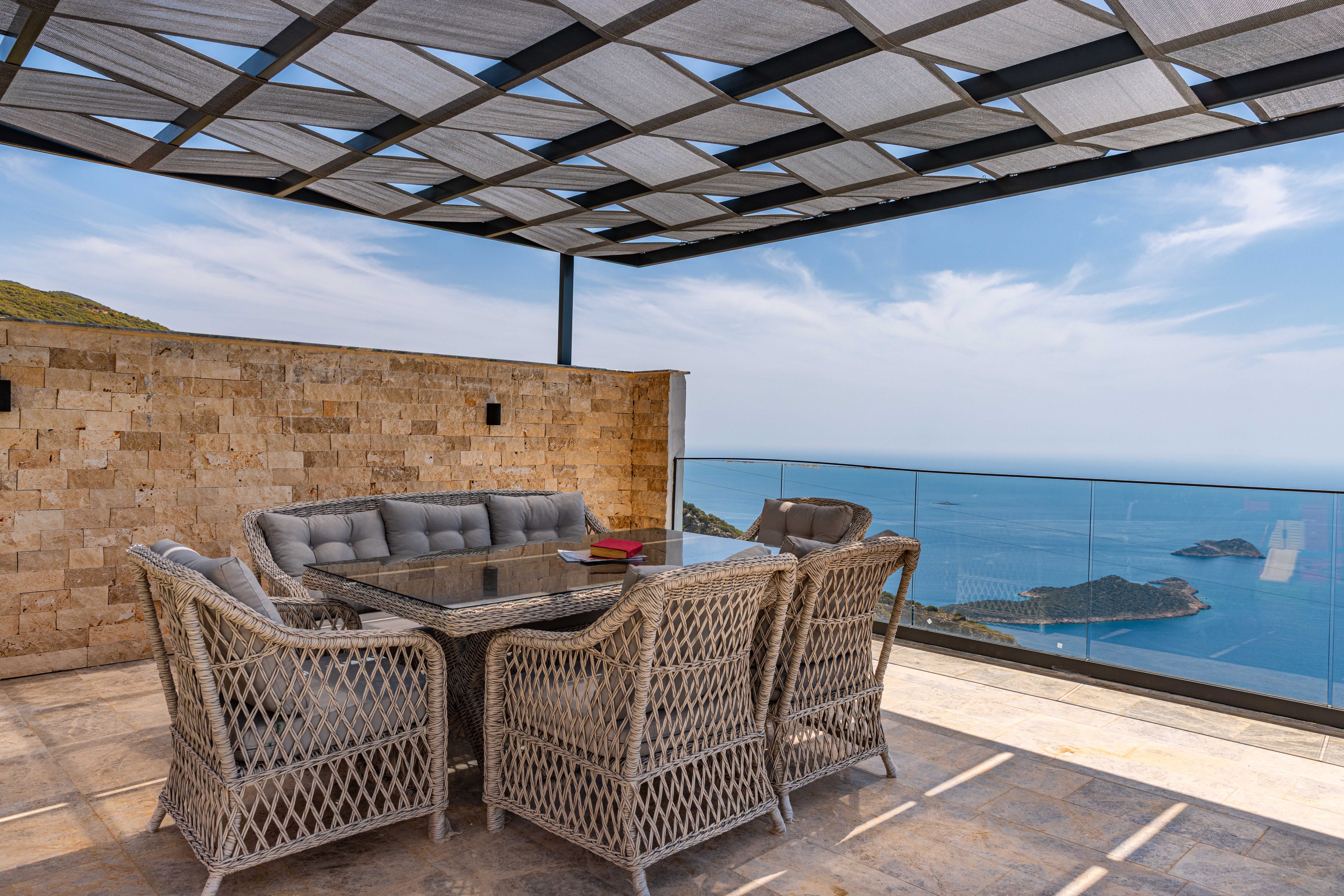 Stylish Outdoor Terrace Overlooking the Ocean · Free Stock Photo