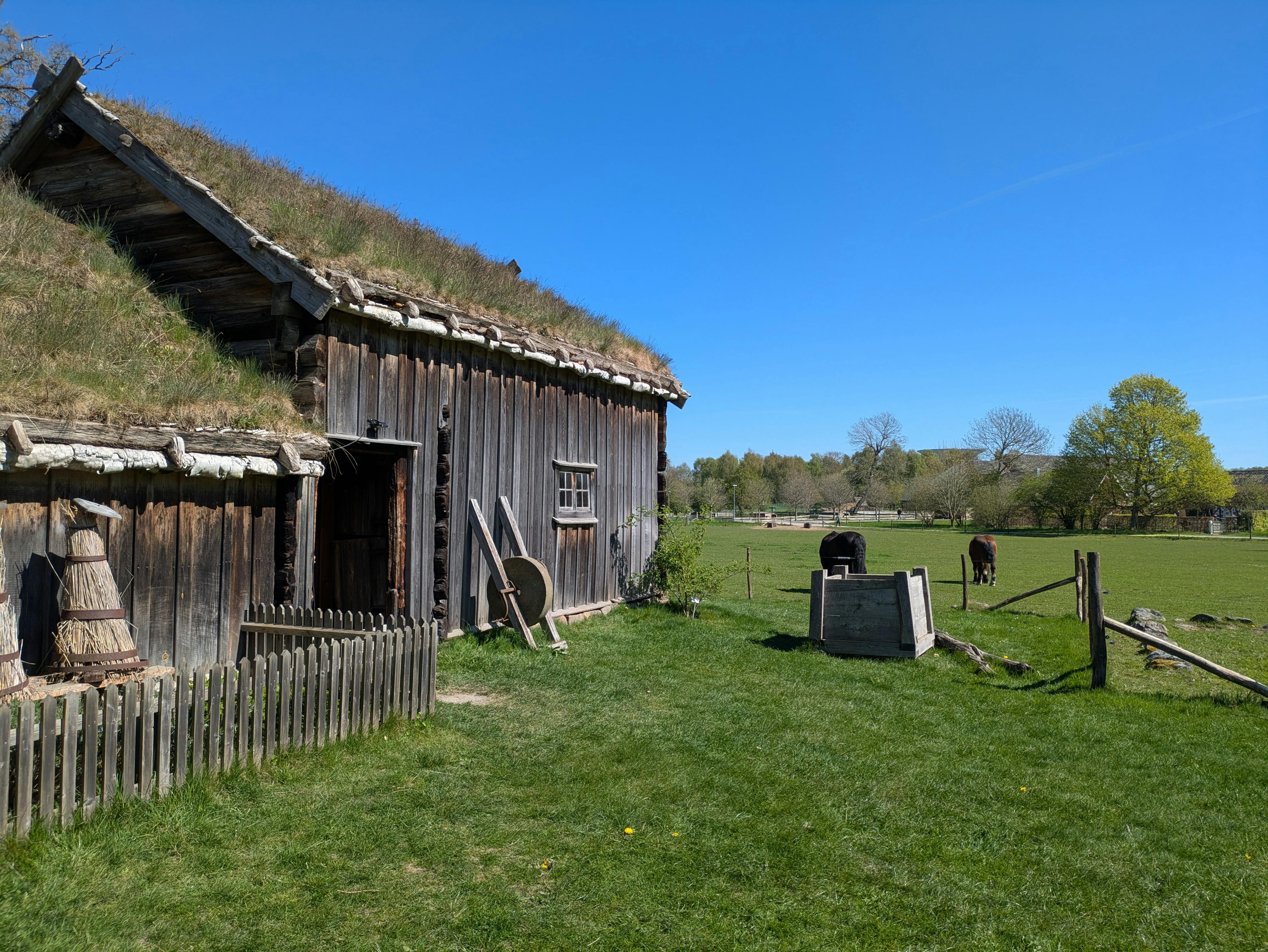 Rustic Farm Building in Scenic Rural Landscape · Free Stock Photo