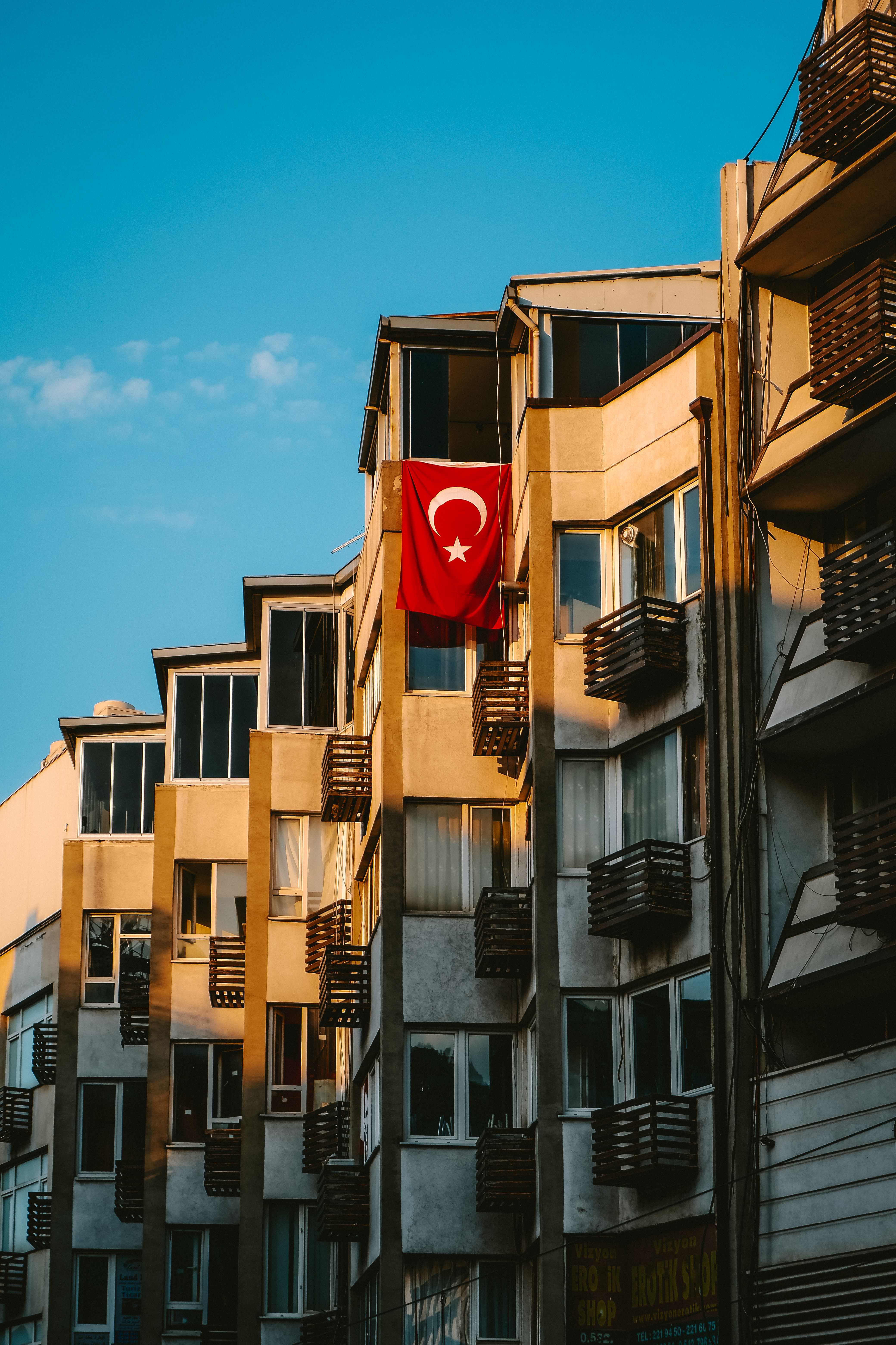 Modern Apartment Building with Turkish Flag · Free Stock Photo