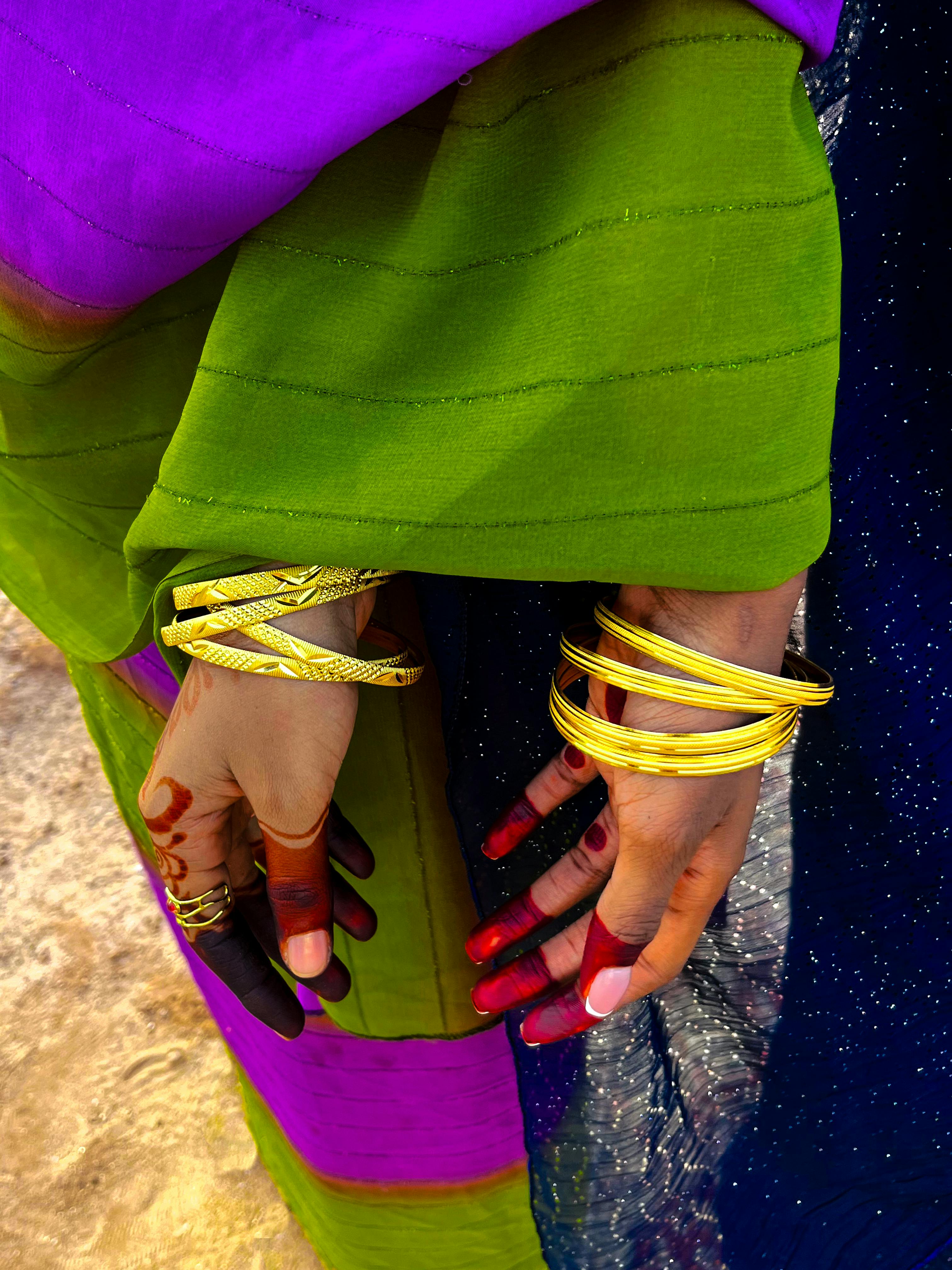 Vibrant Traditional Attire with Henna and Bangles · Free Stock Photo