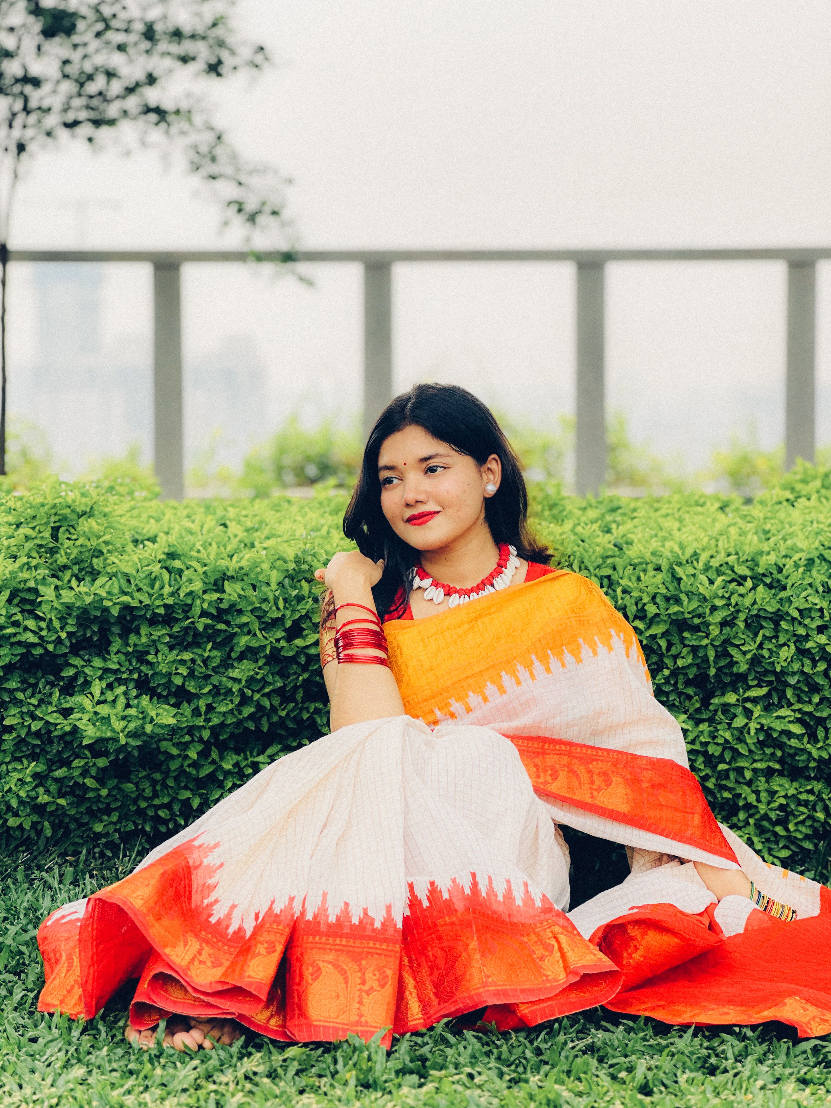 Elegant Woman in Traditional Sari Outdoors · Free Stock Photo