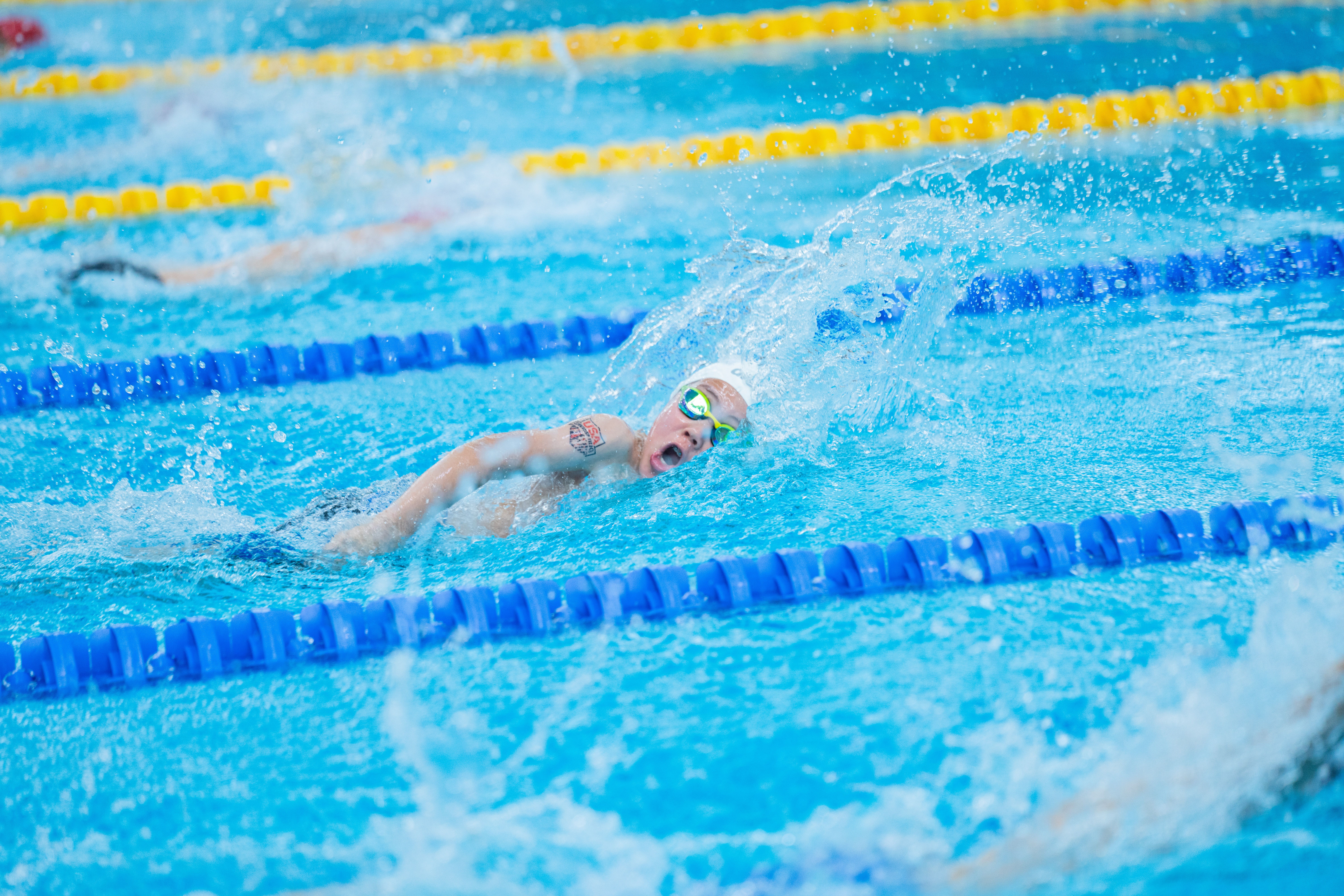 Competitive Swimmer in Action at Swim Meet · Free Stock Photo