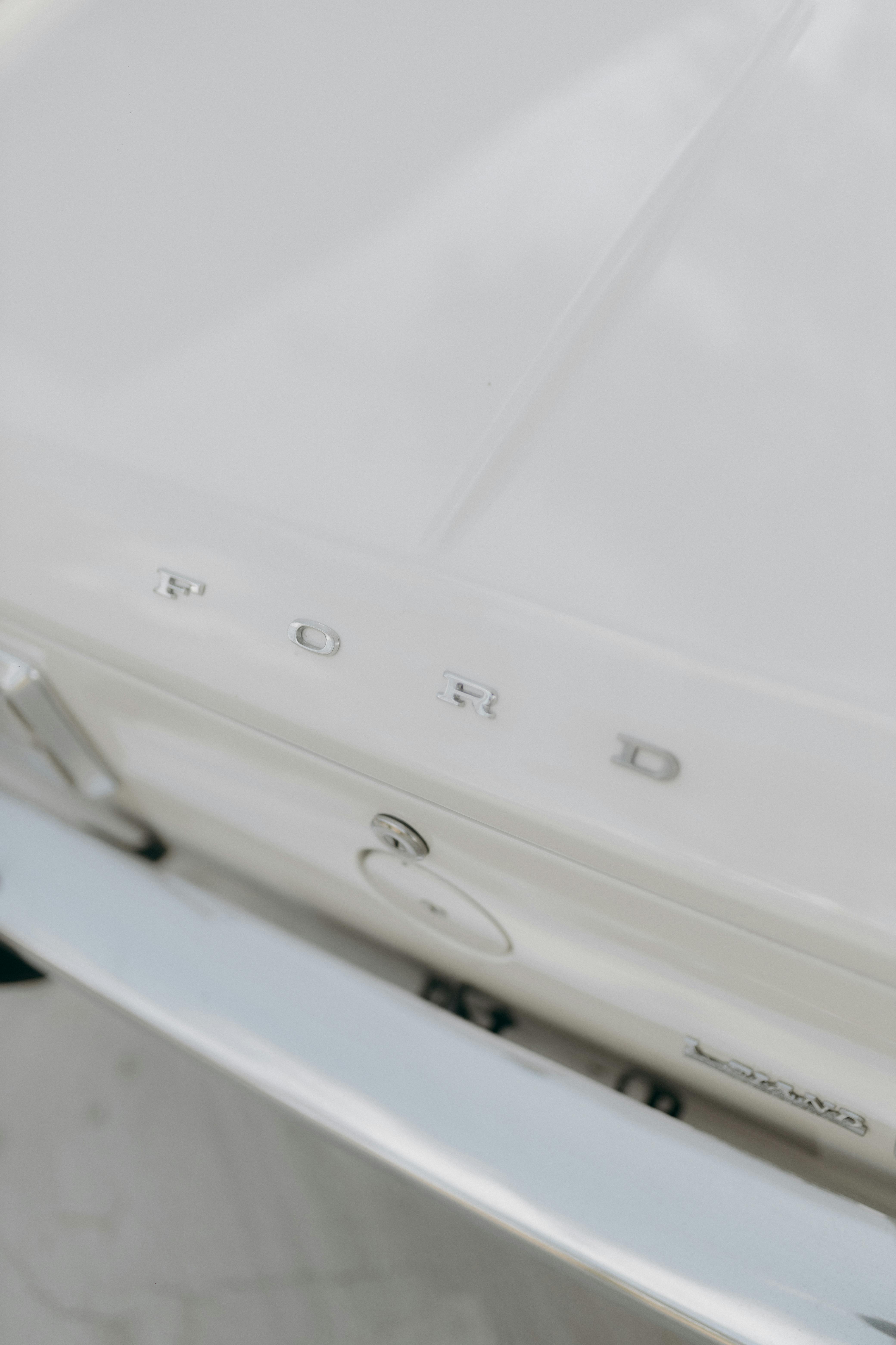 Close-up of Vintage Ford Car Emblem · Free Stock Photo