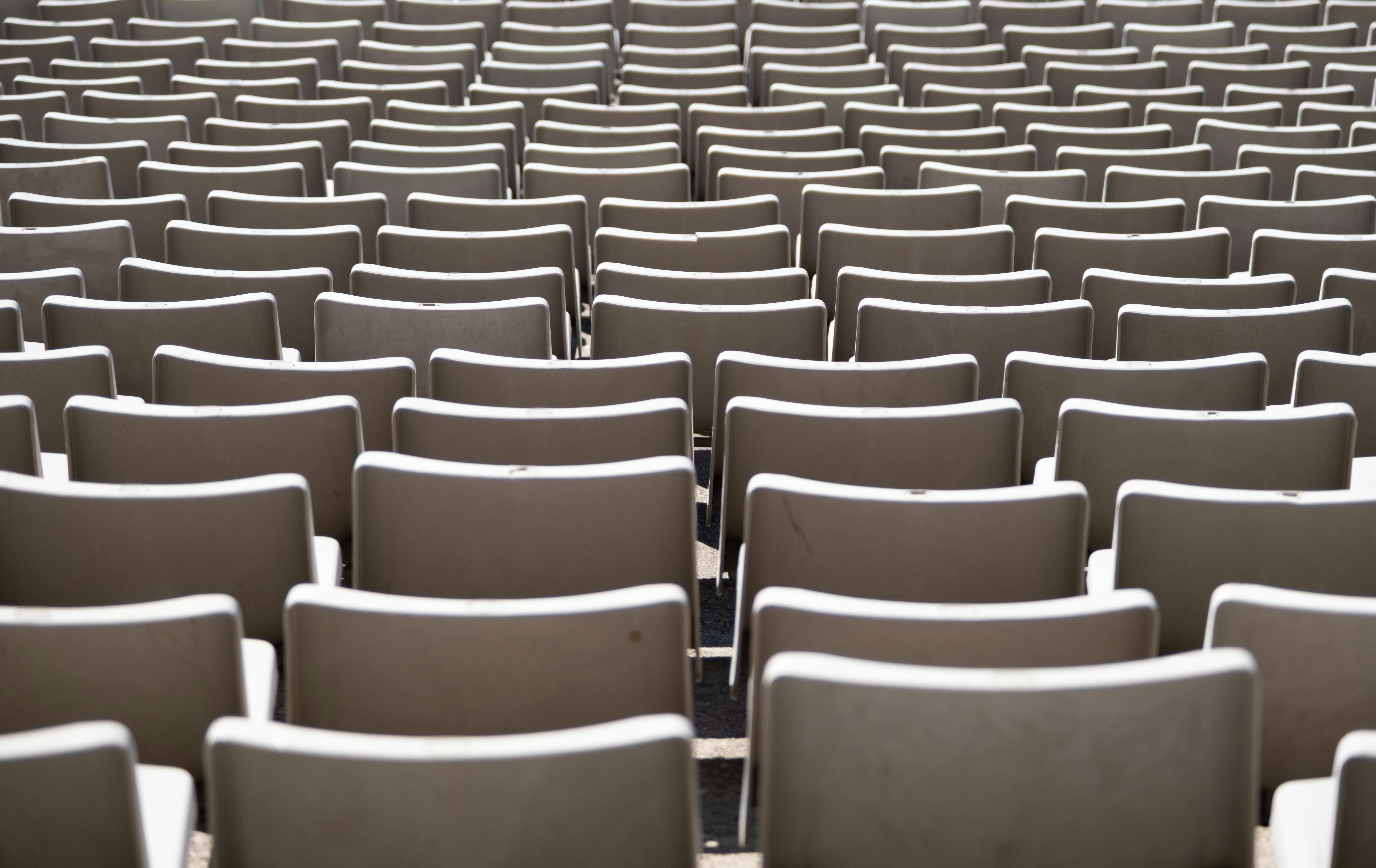Pink and Blue Stadium Chairs · Free Stock Photo