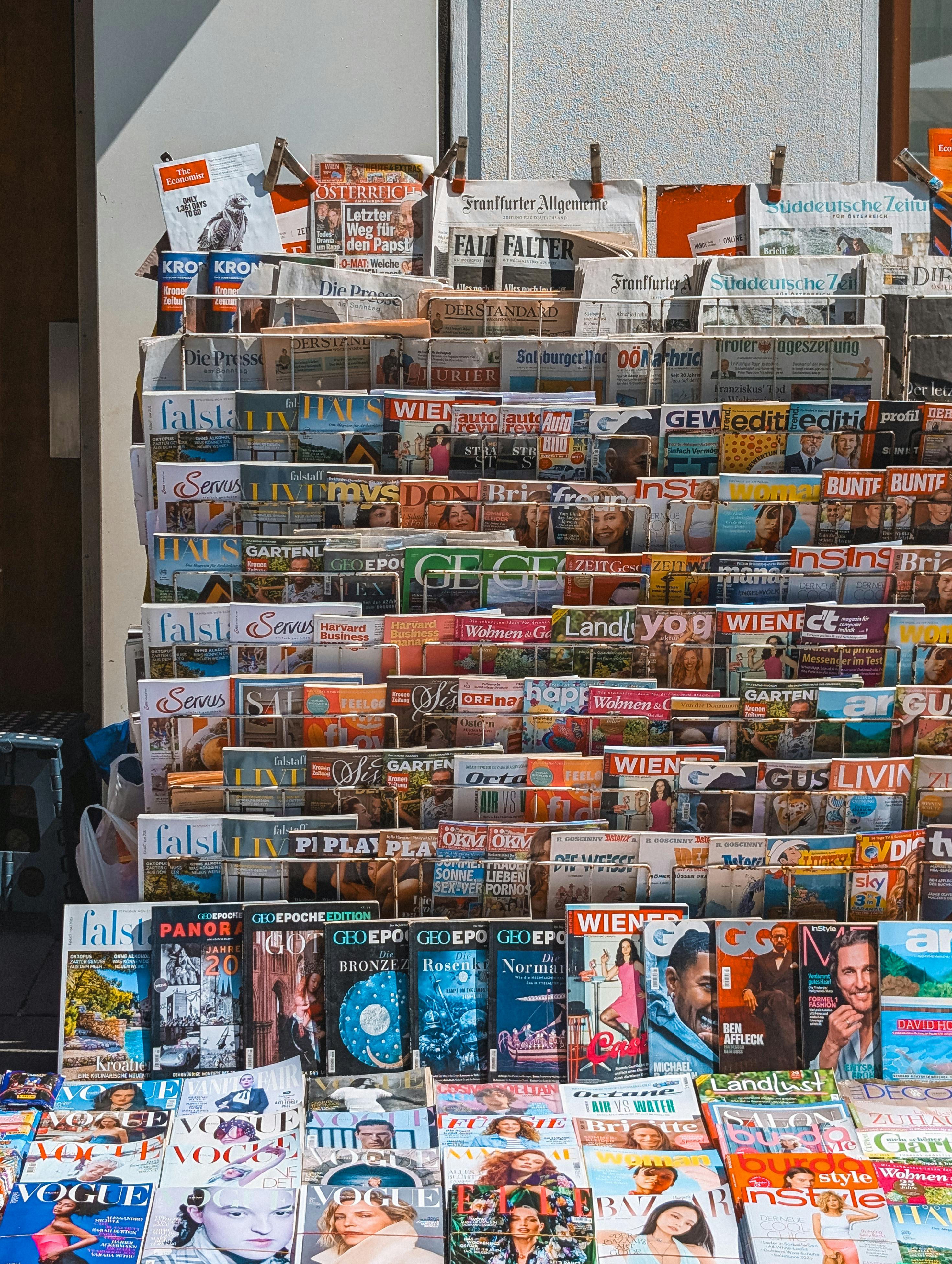 Colorful Magazine and Newspaper Stand Display · Free Stock Photo