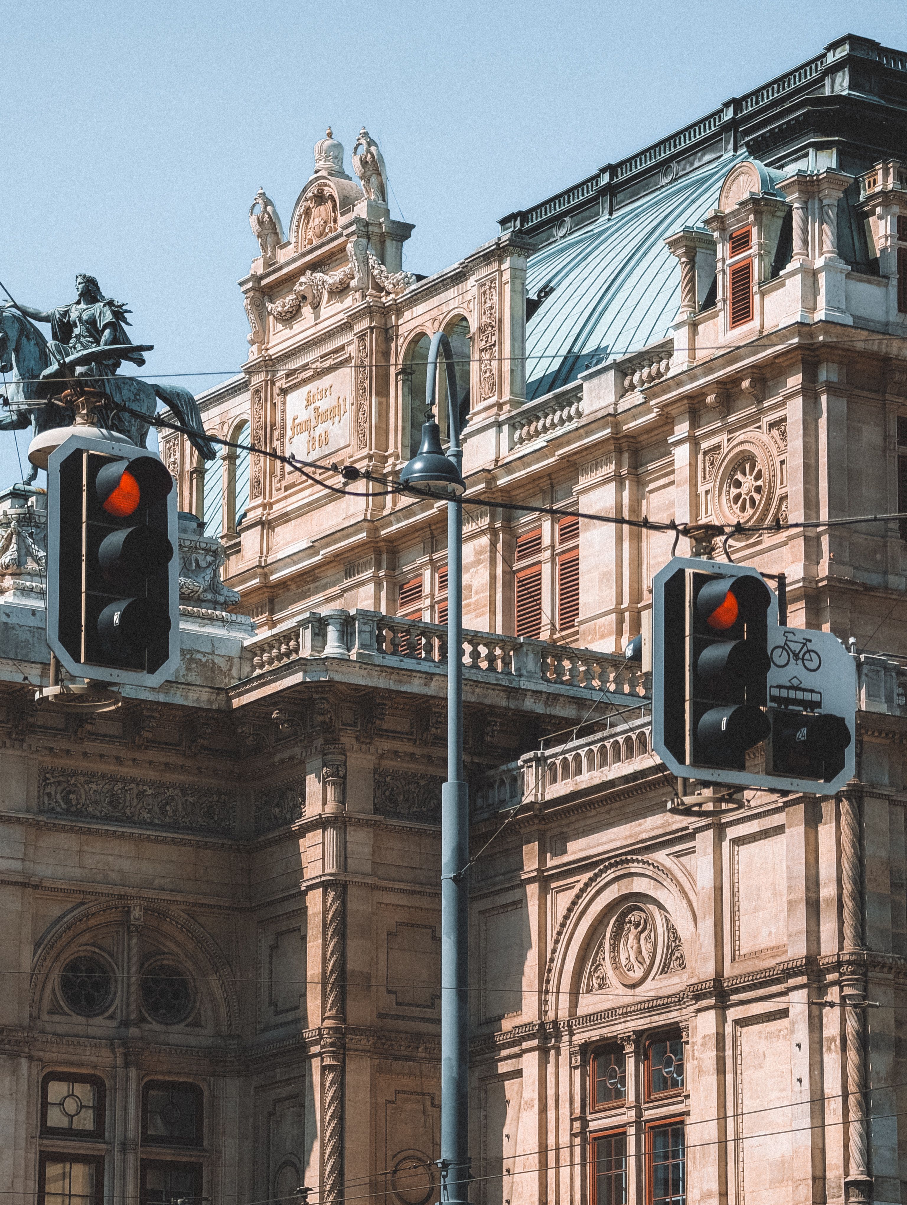 Historic Vienna Opera House with Traffic Lights · Free Stock Photo