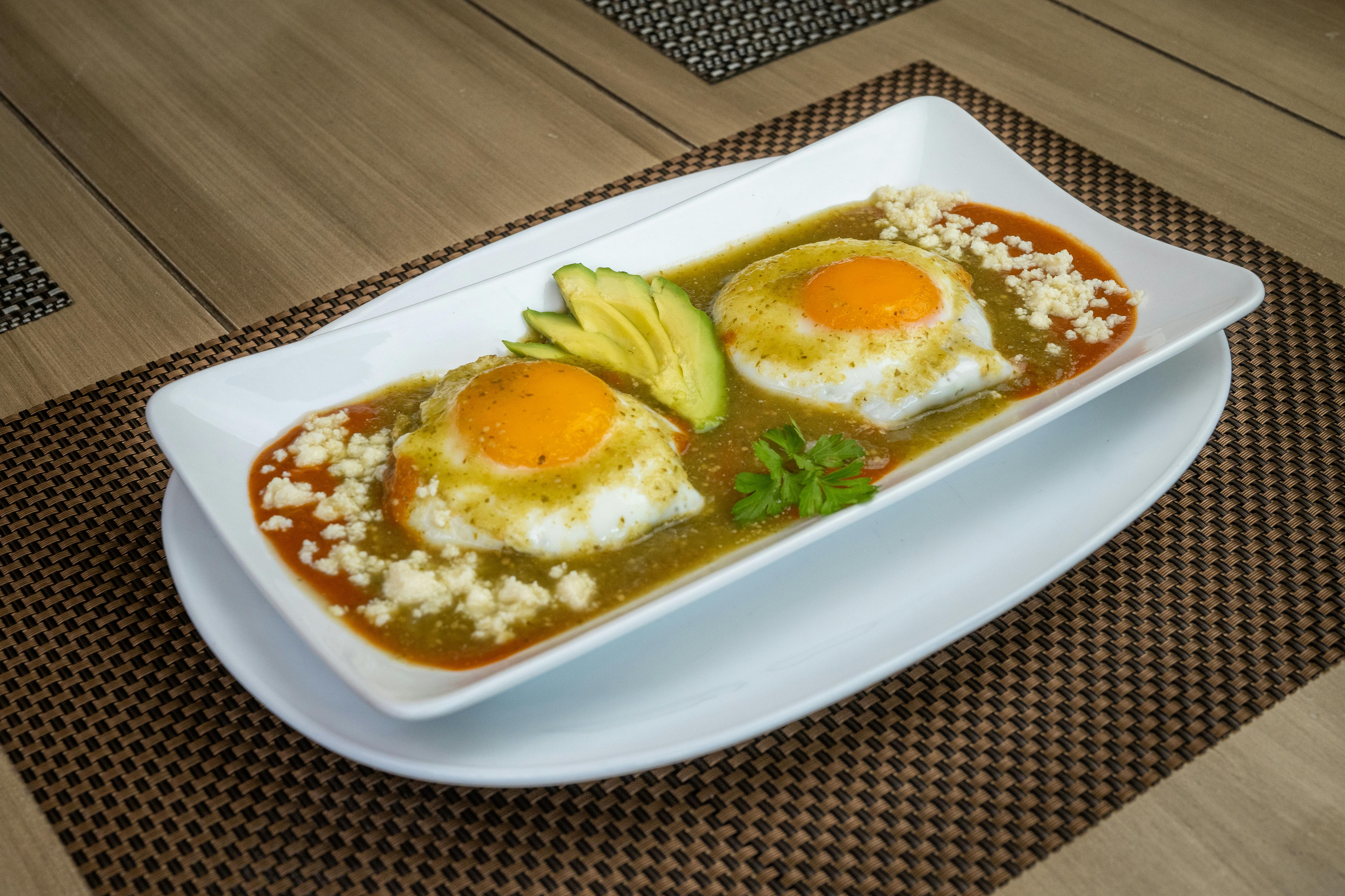Authentic Mexican Huevos Rancheros on Plate · Free Stock Photo