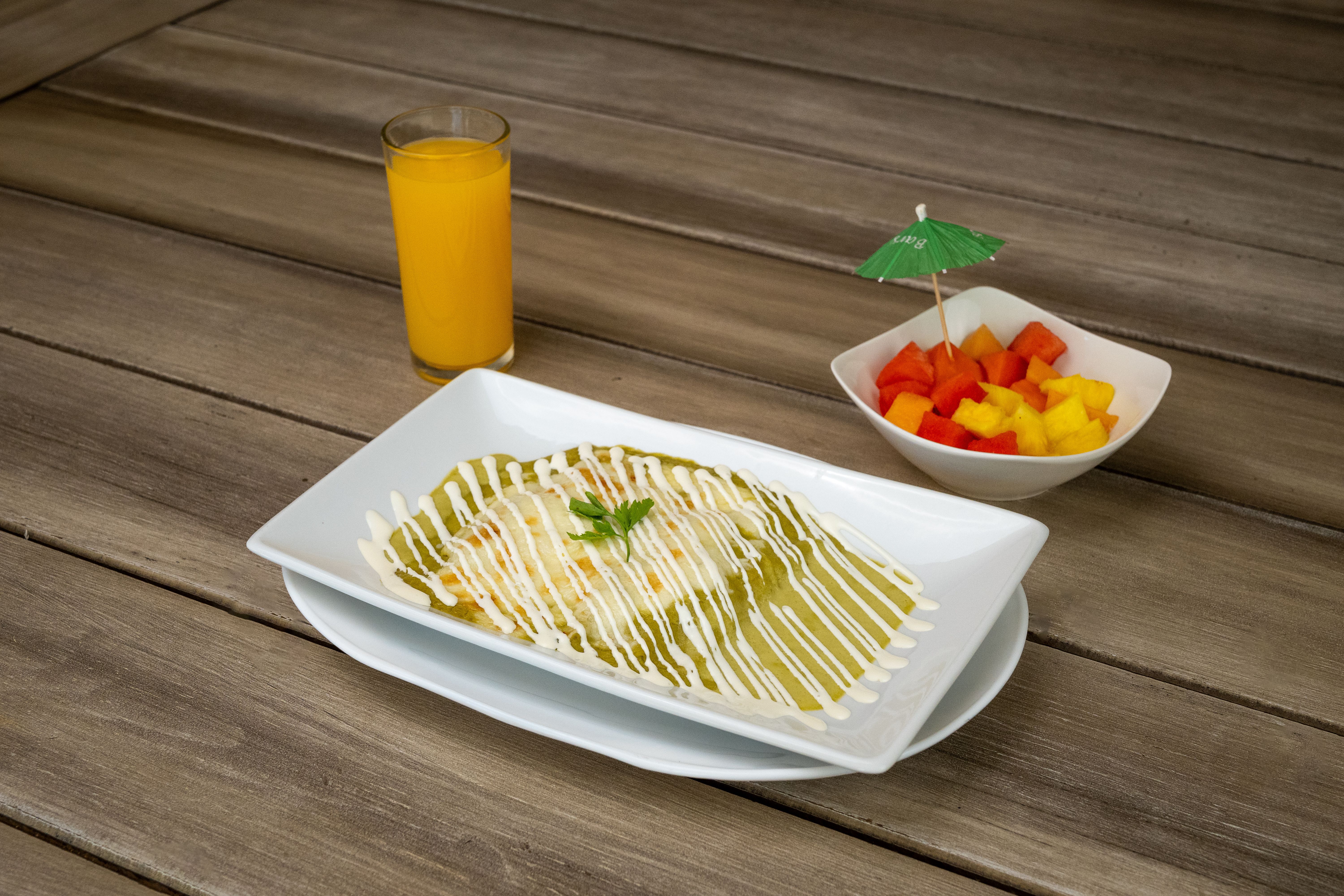 Delicious Mexican Enchiladas with Fresh Juice · Free Stock Photo