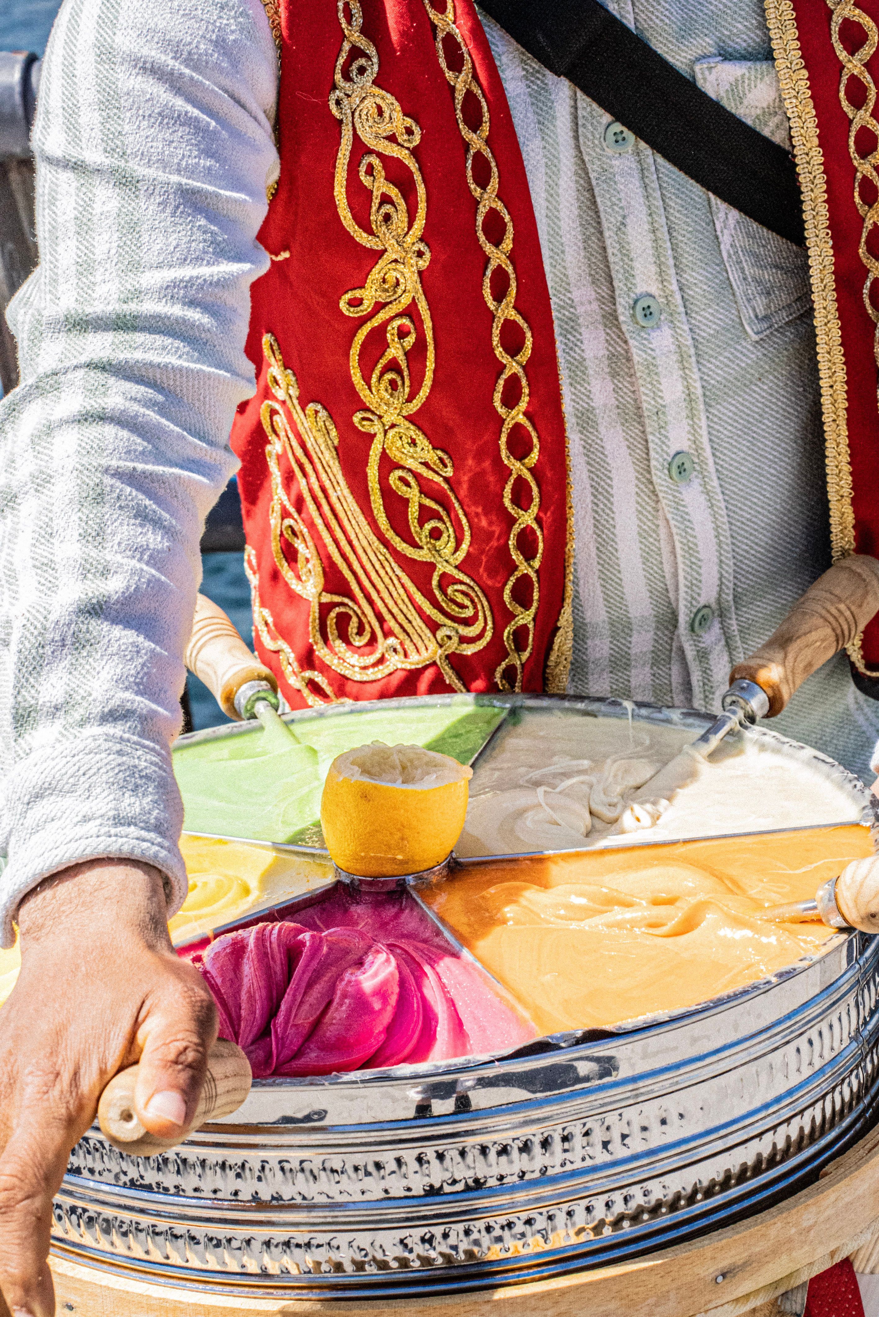 Turkish Ice Cream Vendor in Traditional Attire · Free Stock Photo