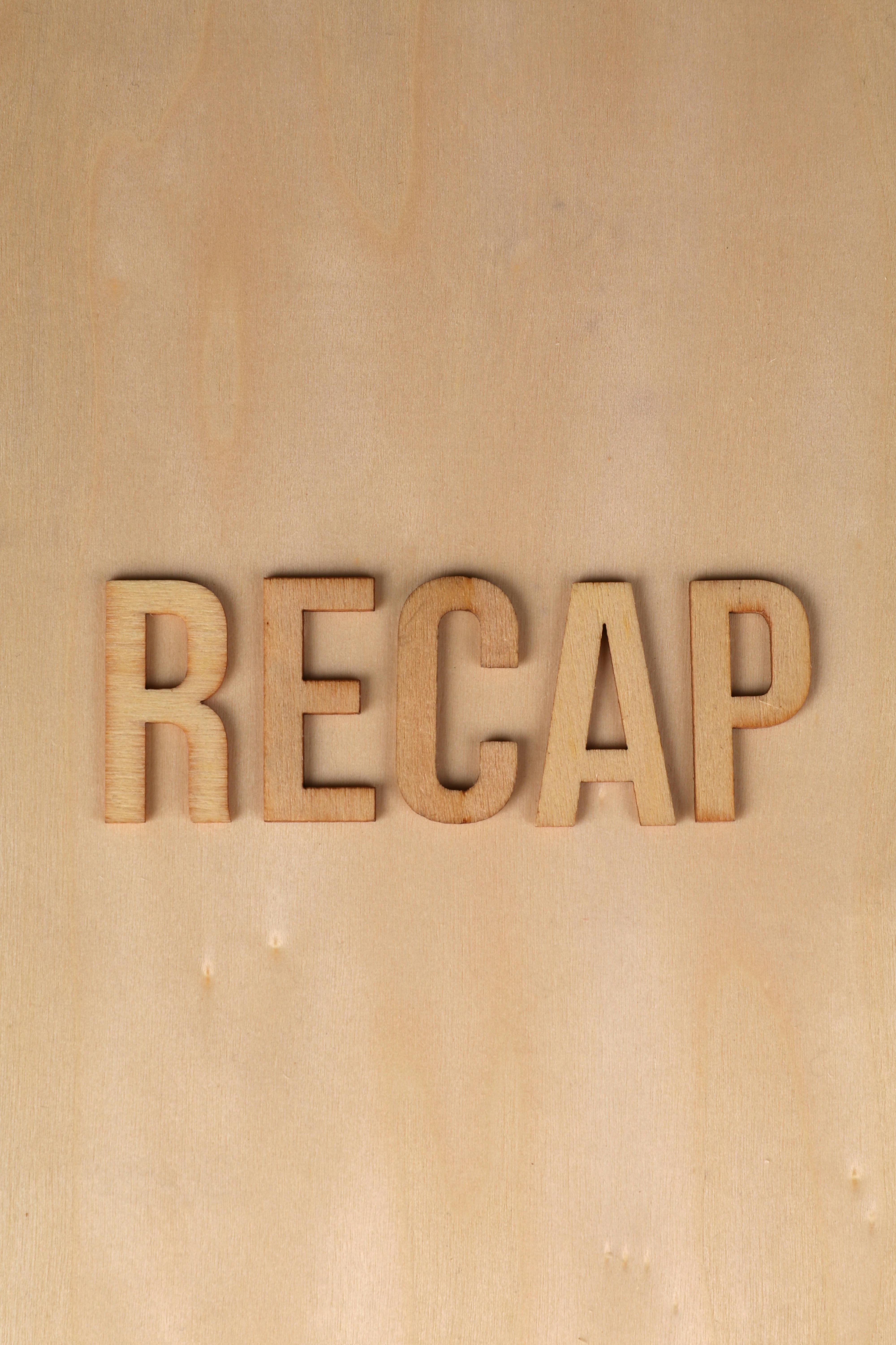 Wooden Letters Forming the Word RECAP on Wood · Free Stock Photo