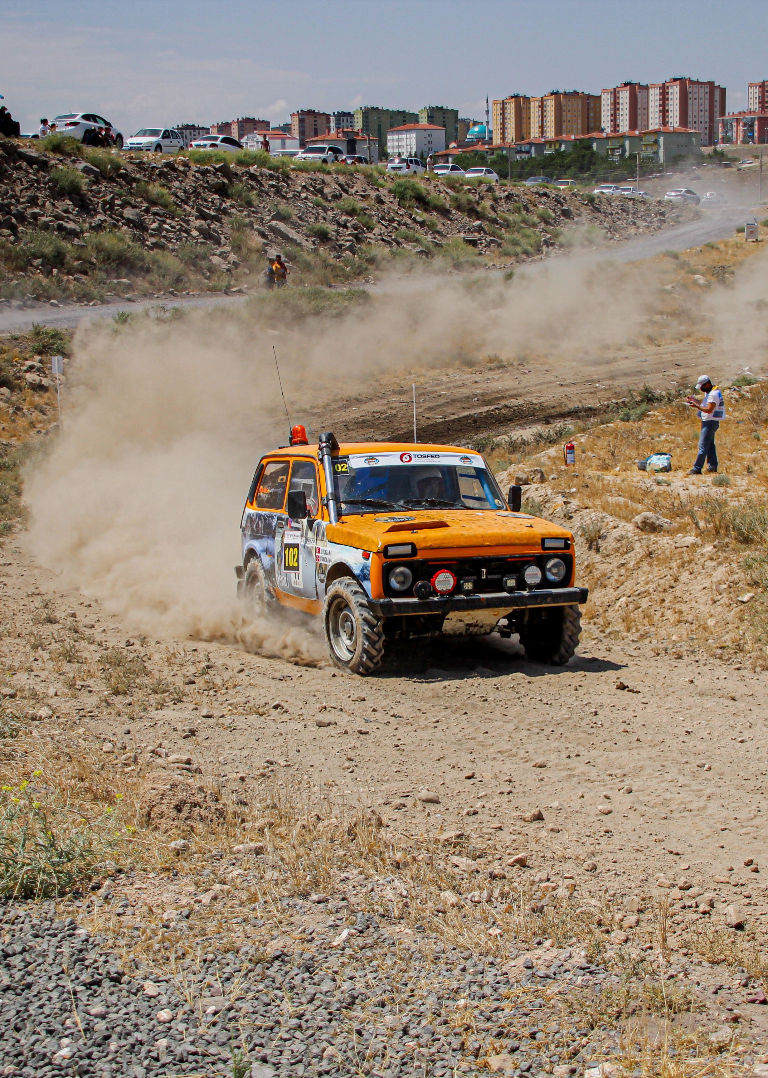 Competitive Off-Road Rally Car in Action · Free Stock Photo