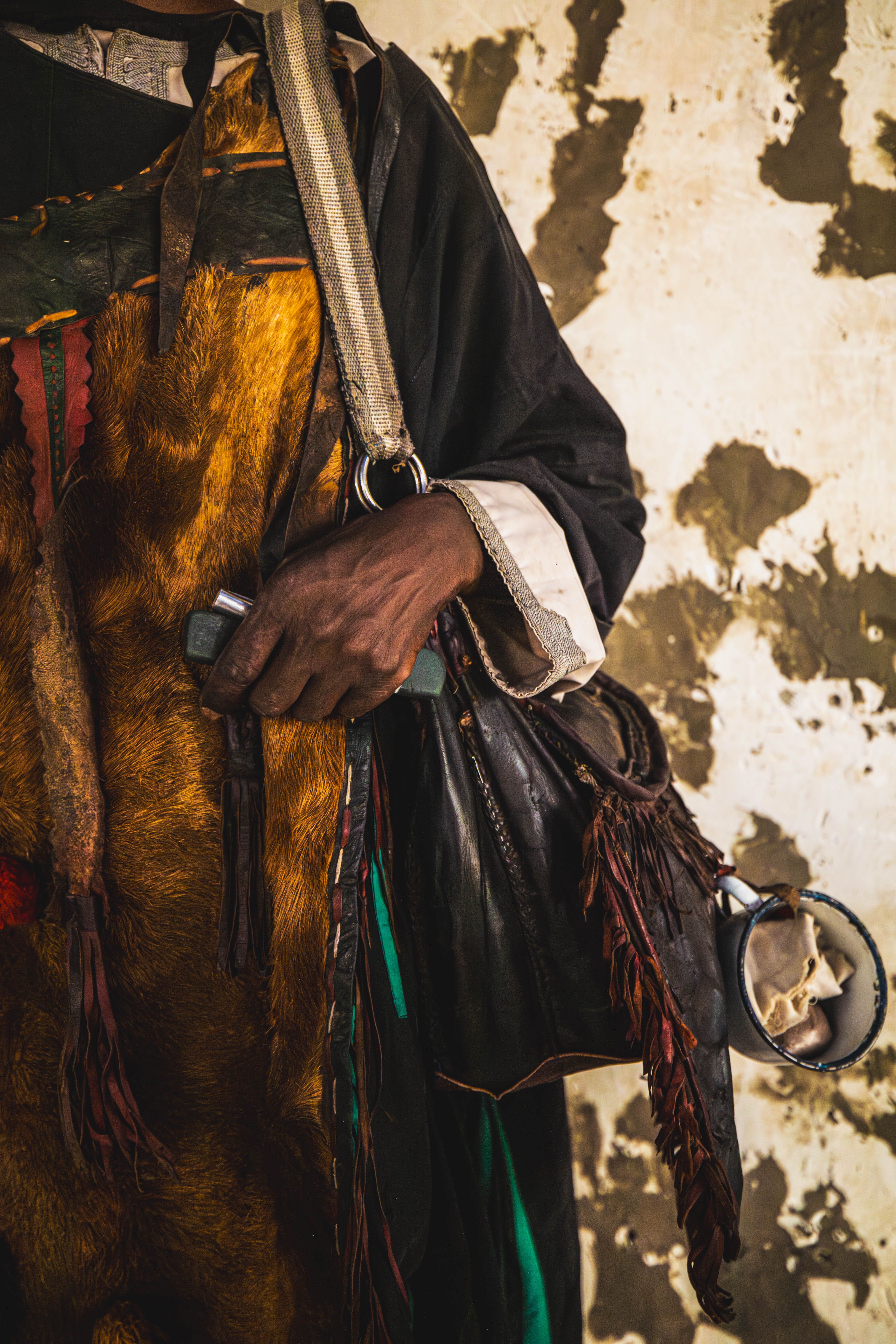 Traditional African Attire with Handbag and Tools · Free Stock Photo