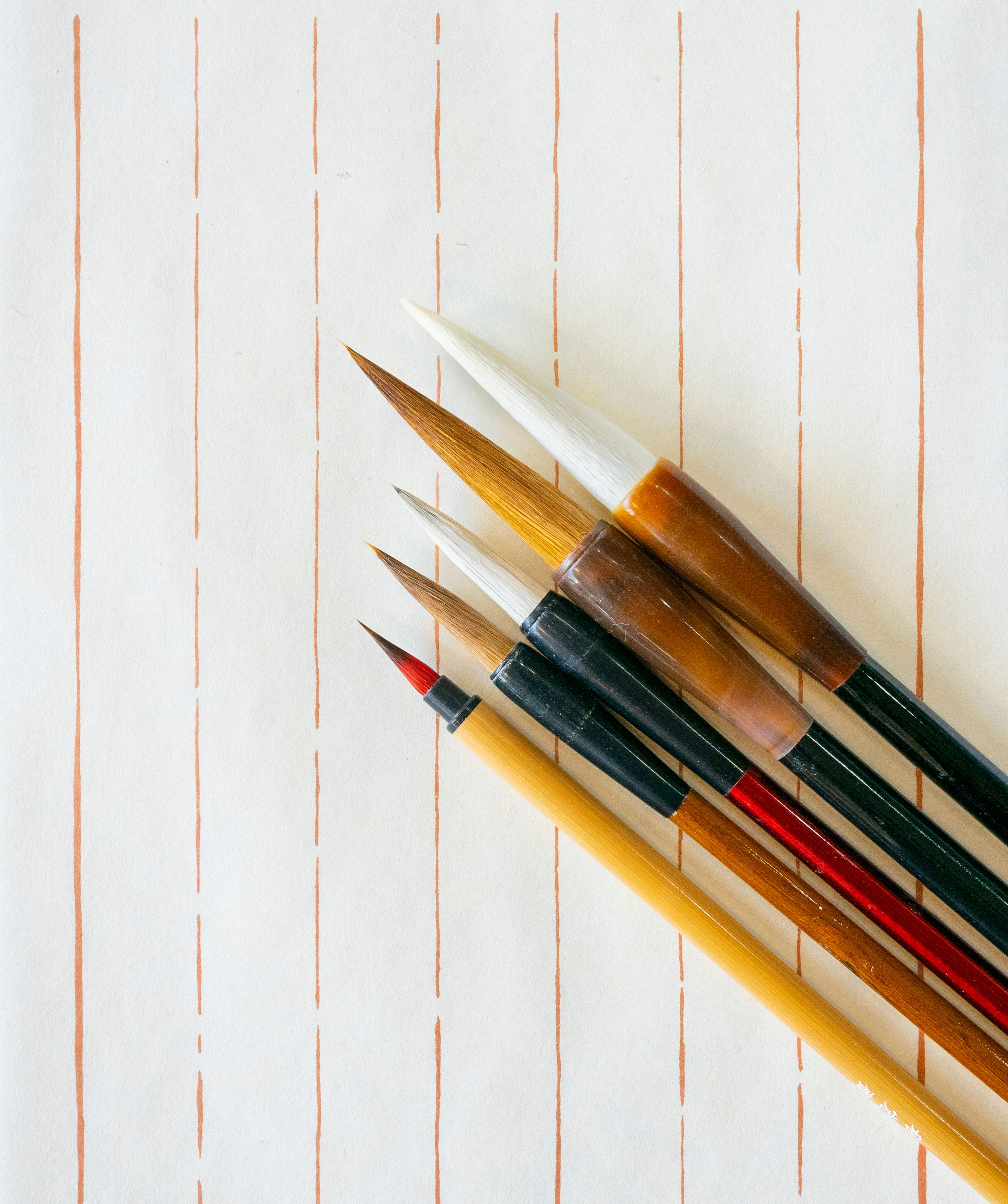 Traditional Japanese Calligraphy Brushes on Xuan Paper · Free Stock Photo