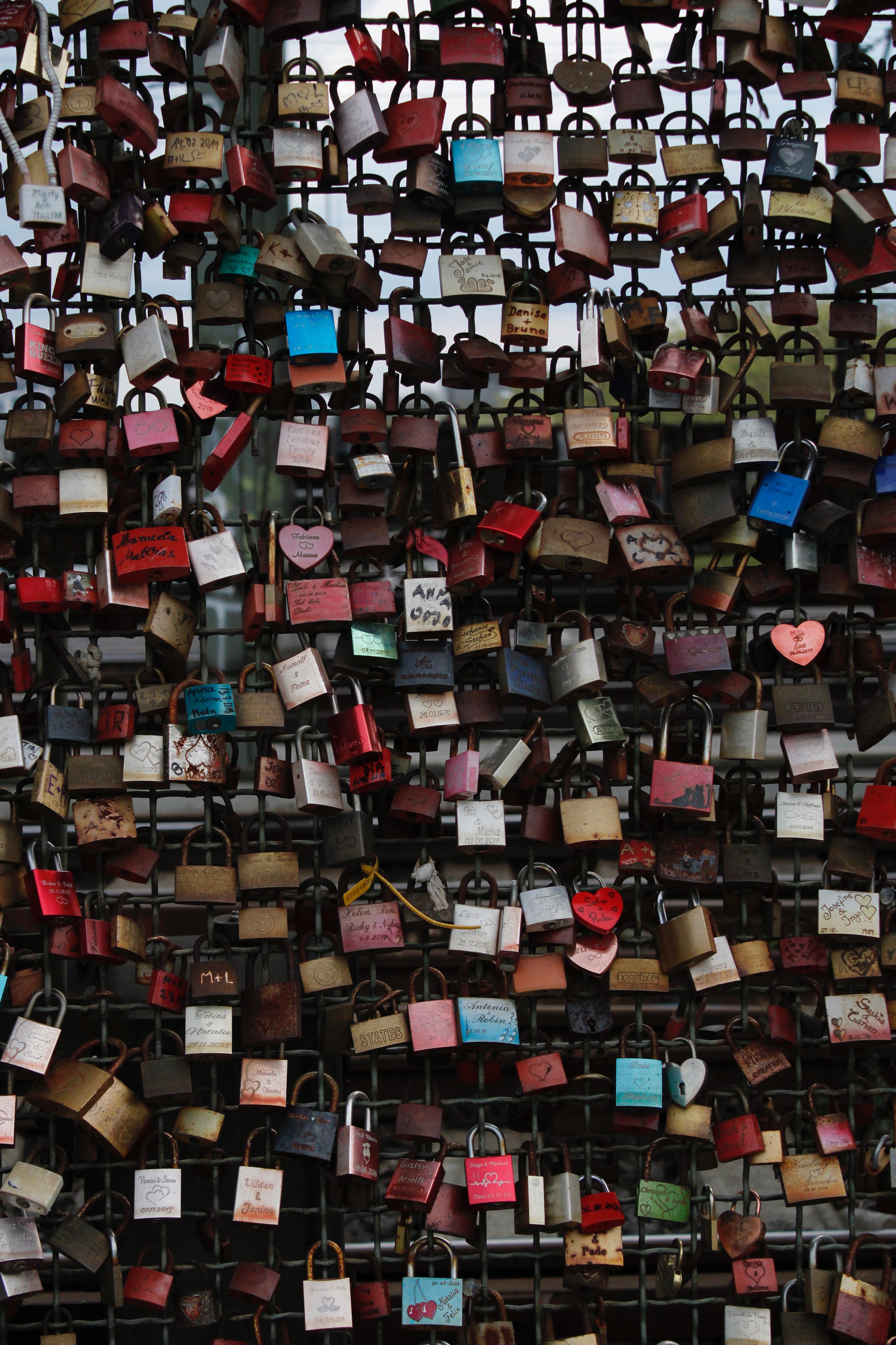 Colorful Love Locks on Bridge Fence · Free Stock Photo
