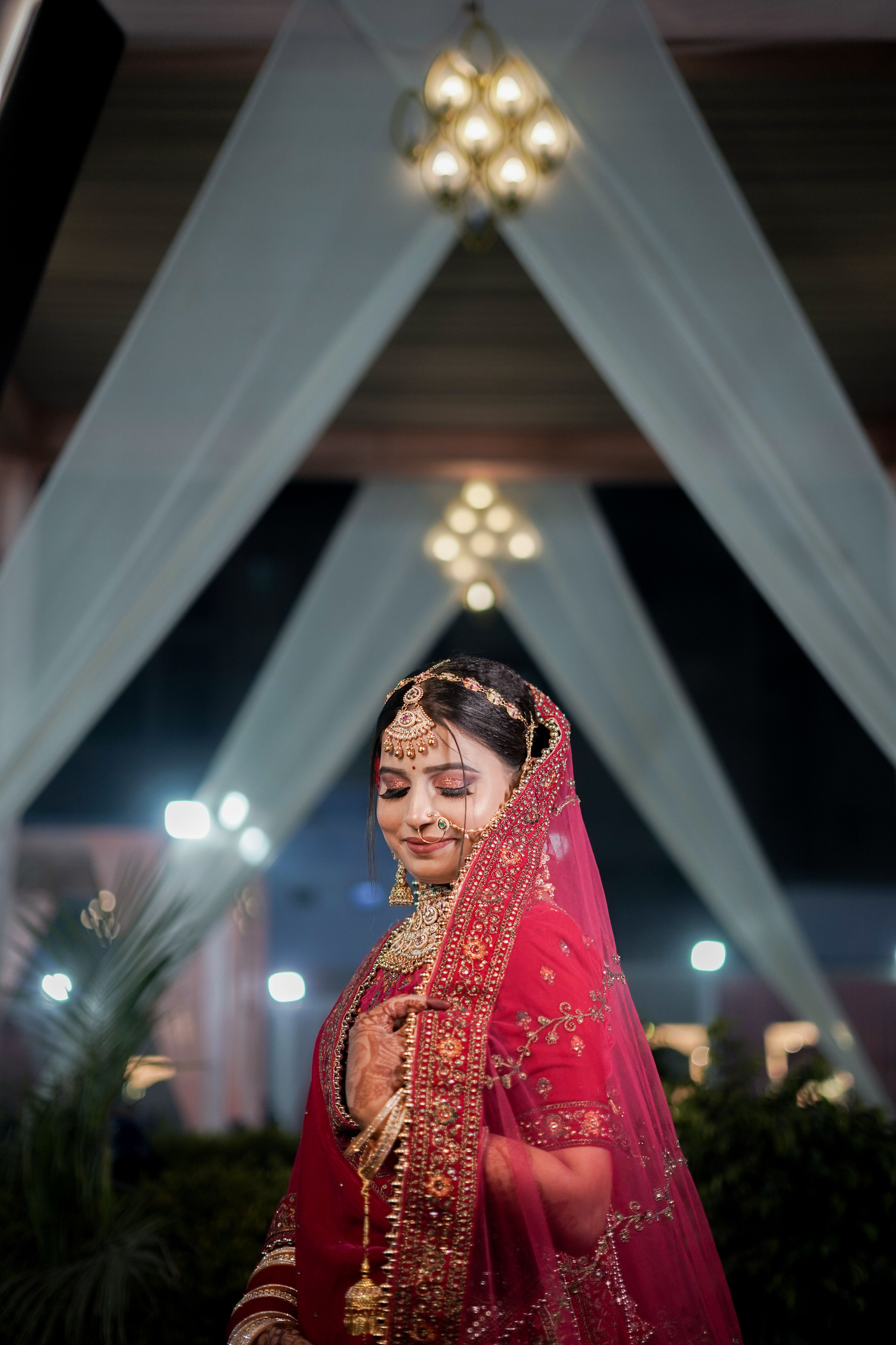 Elegant Indian Bride in Traditional Red Attire · Free Stock Photo