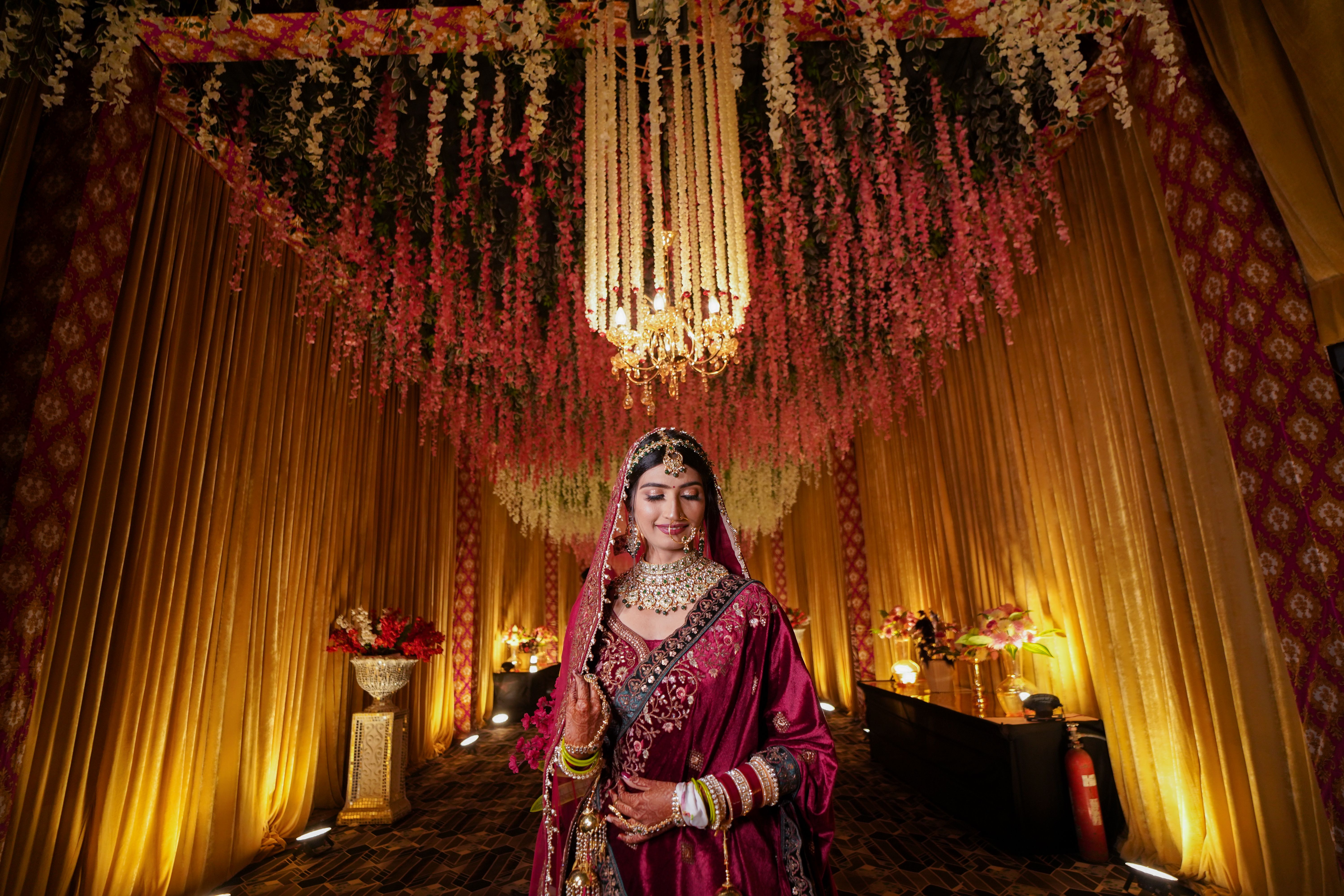 Elegant Indian Bride in a Vibrant Wedding Setting · Free Stock Photo