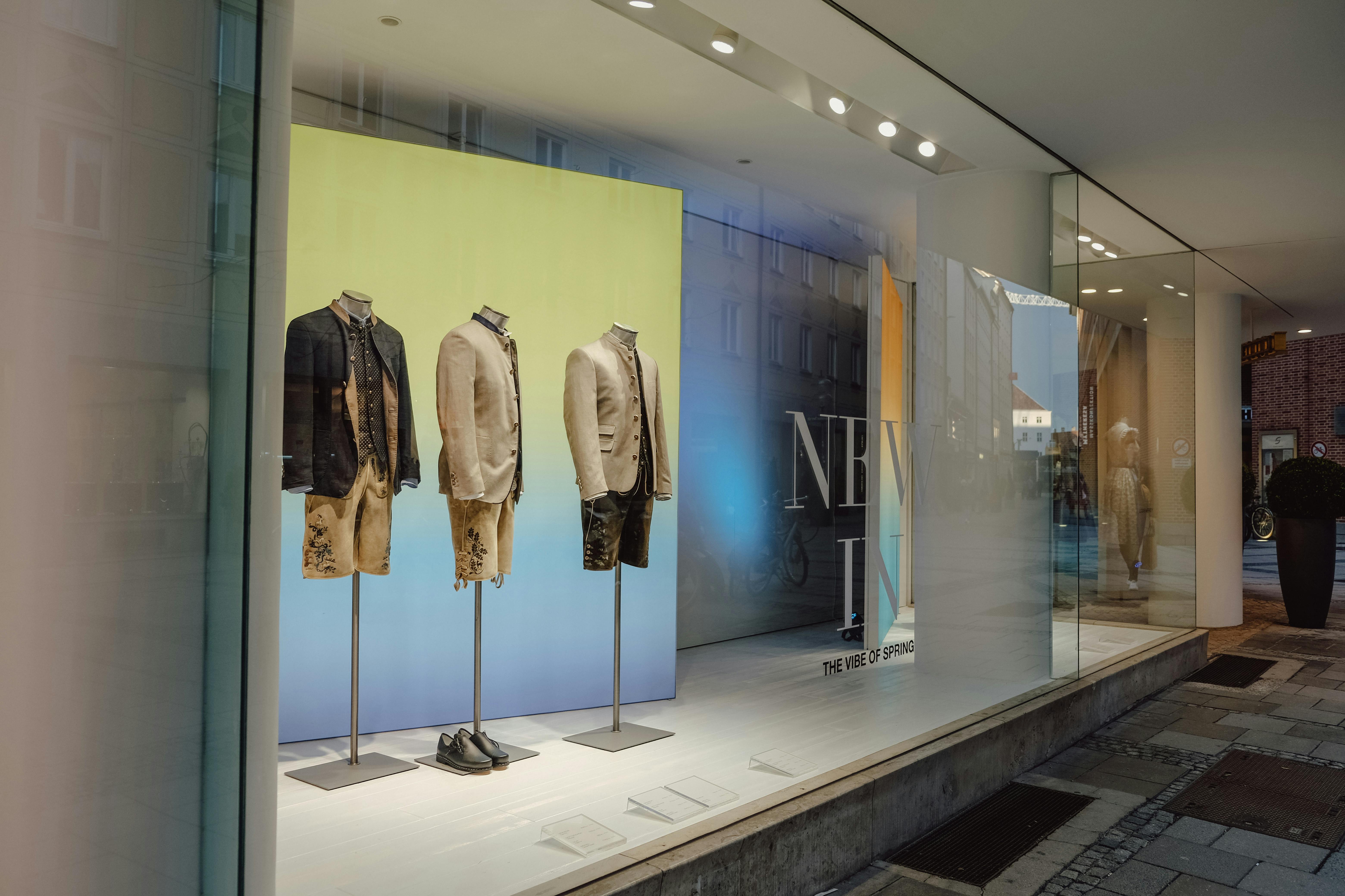 Elegant Storefront Display with Formal Outfits · Free Stock Photo