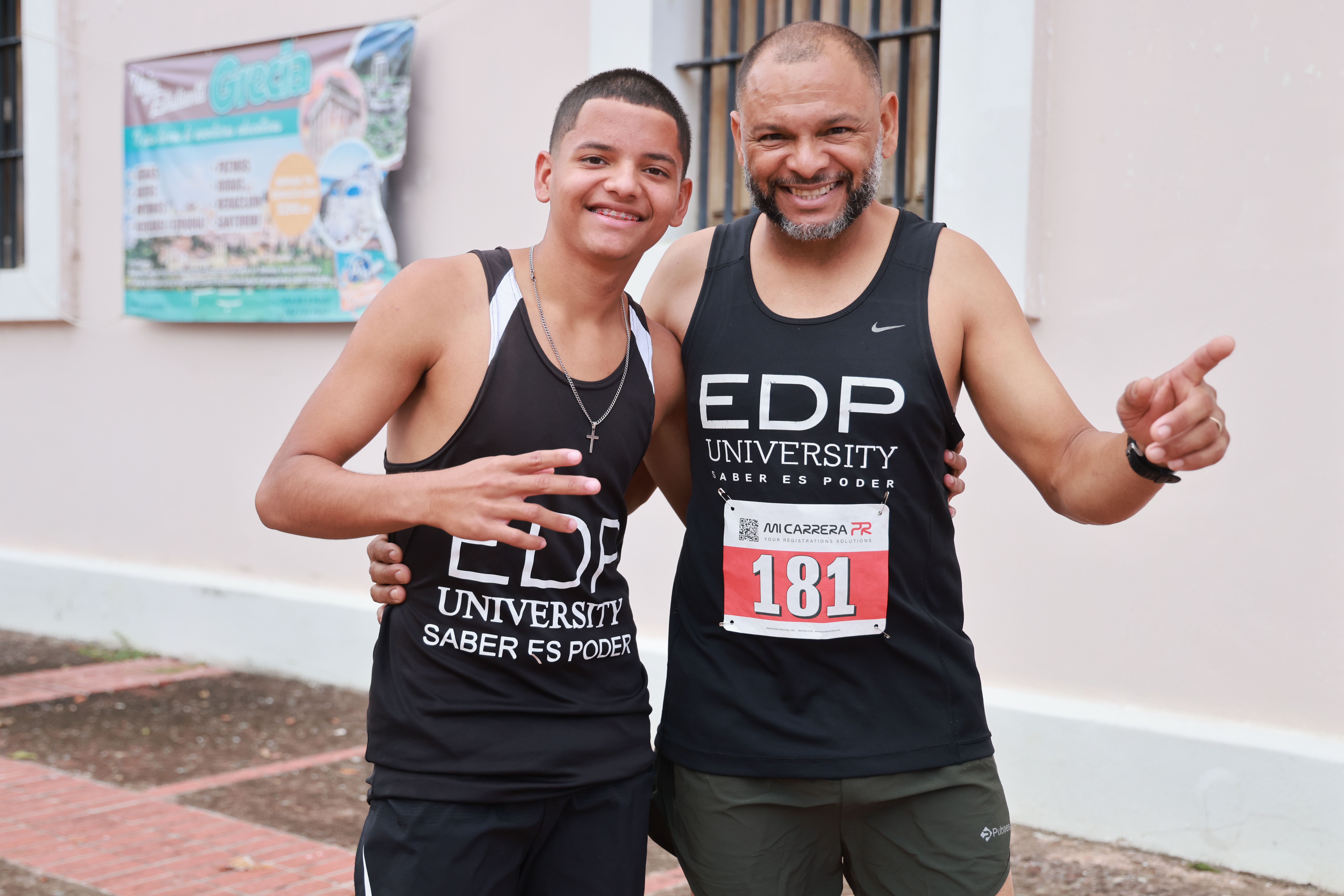 Father and Son at University Charity Run Event · Free Stock Photo