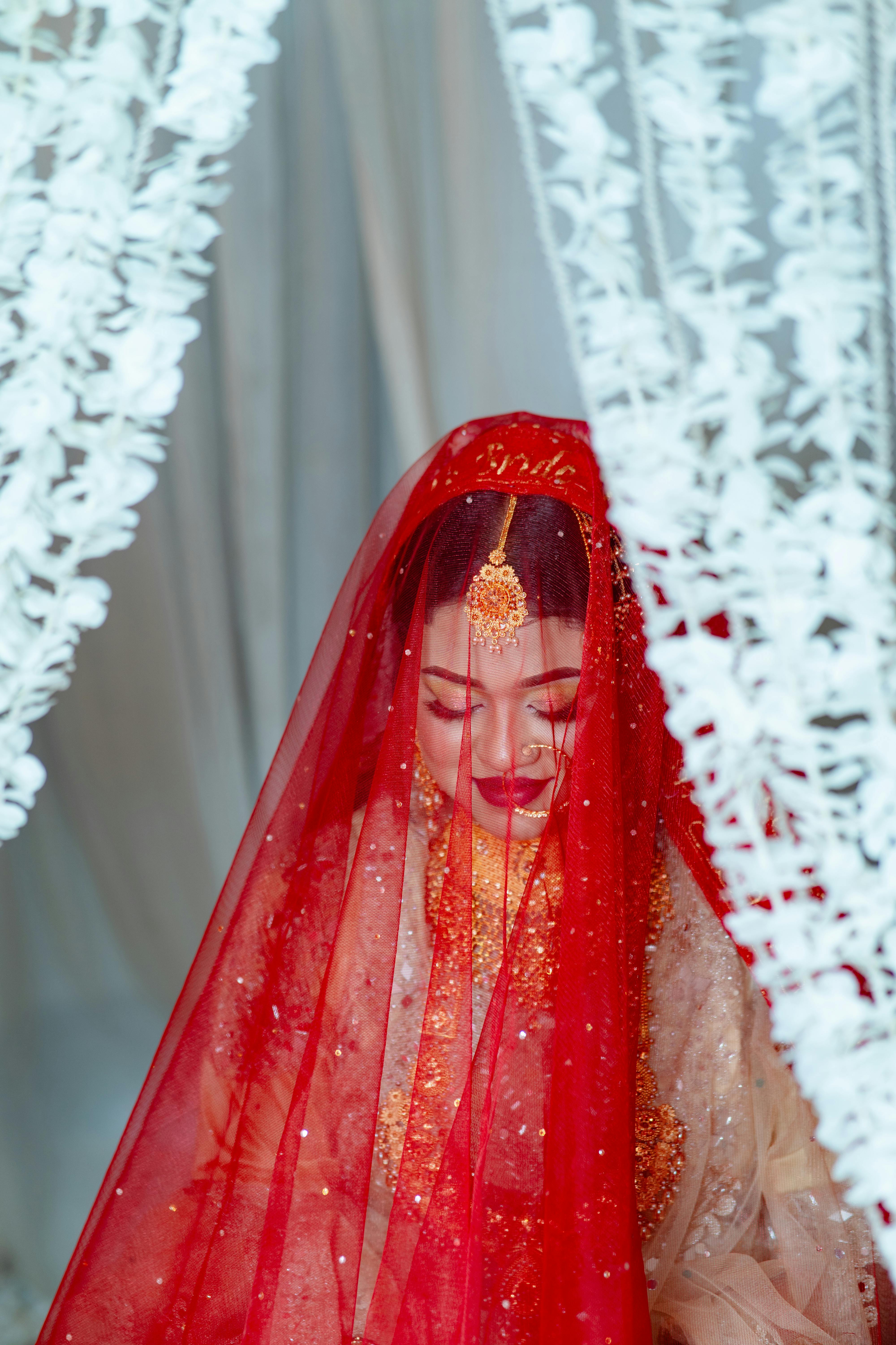 Beautiful Bride in Traditional Red Wedding Attire · Free Stock Photo