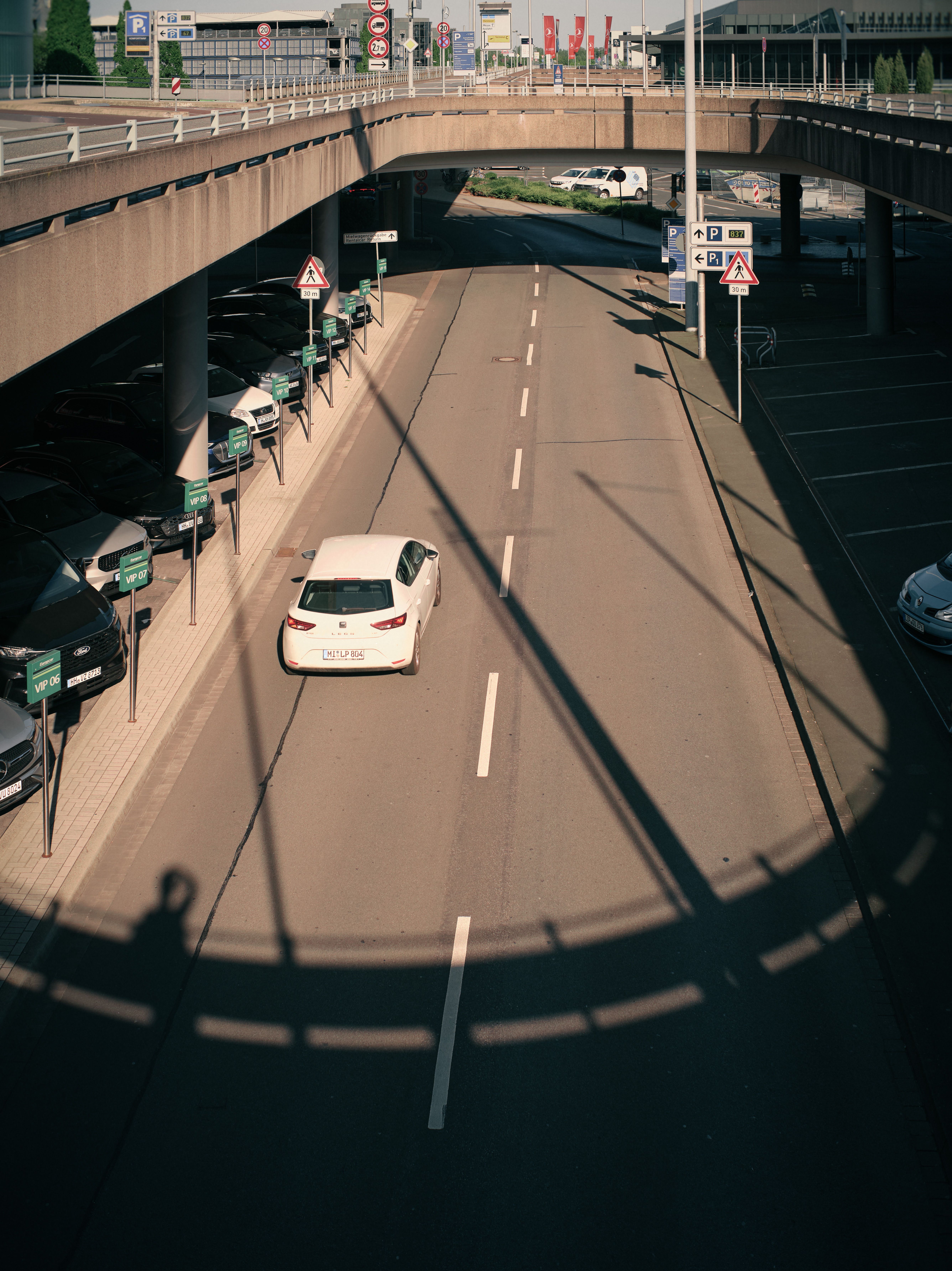 Aerial view of urban roadway with shadow patterns · Free Stock Photo