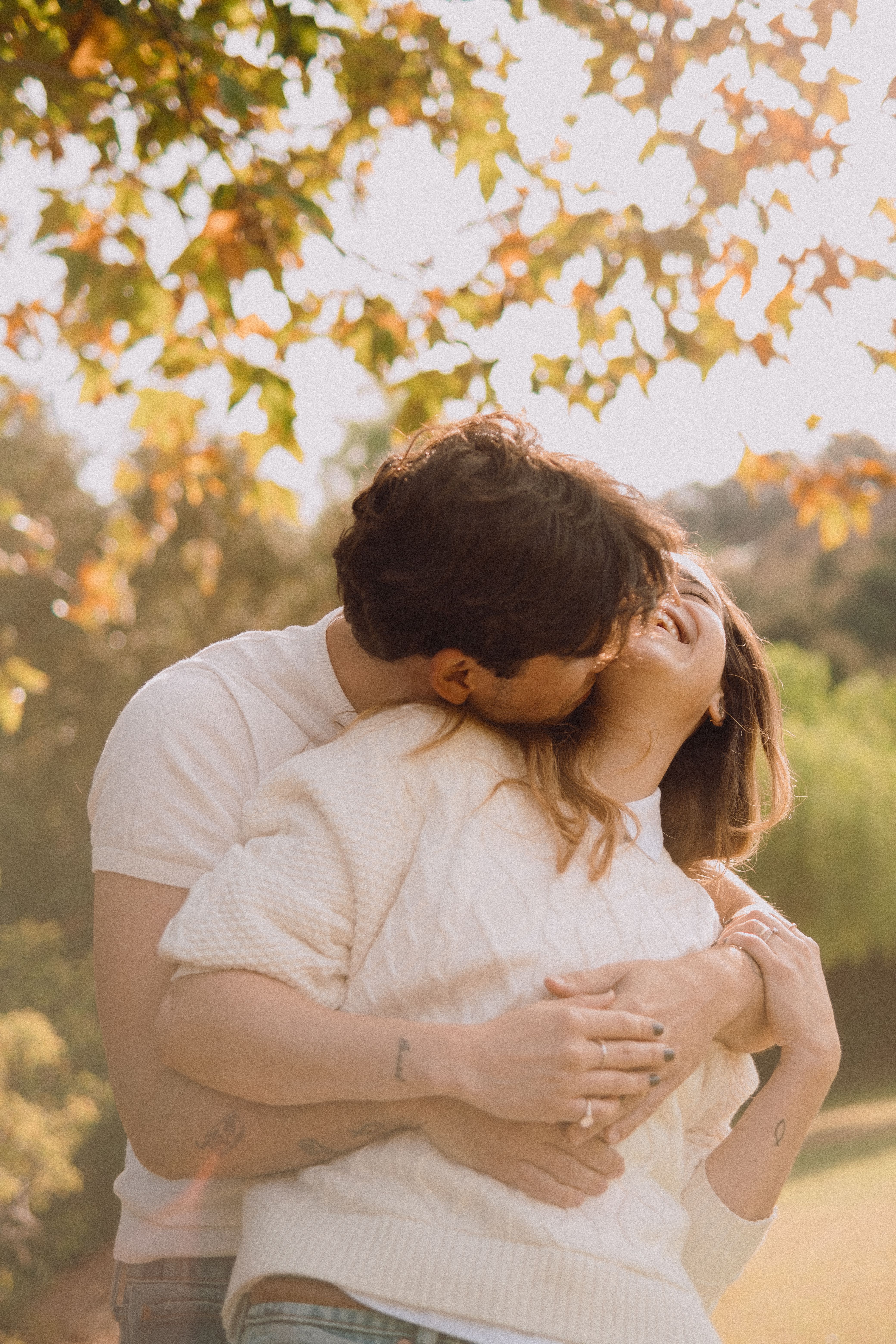 Romantic Couple Embracing in Autumn Light · Free Stock Photo