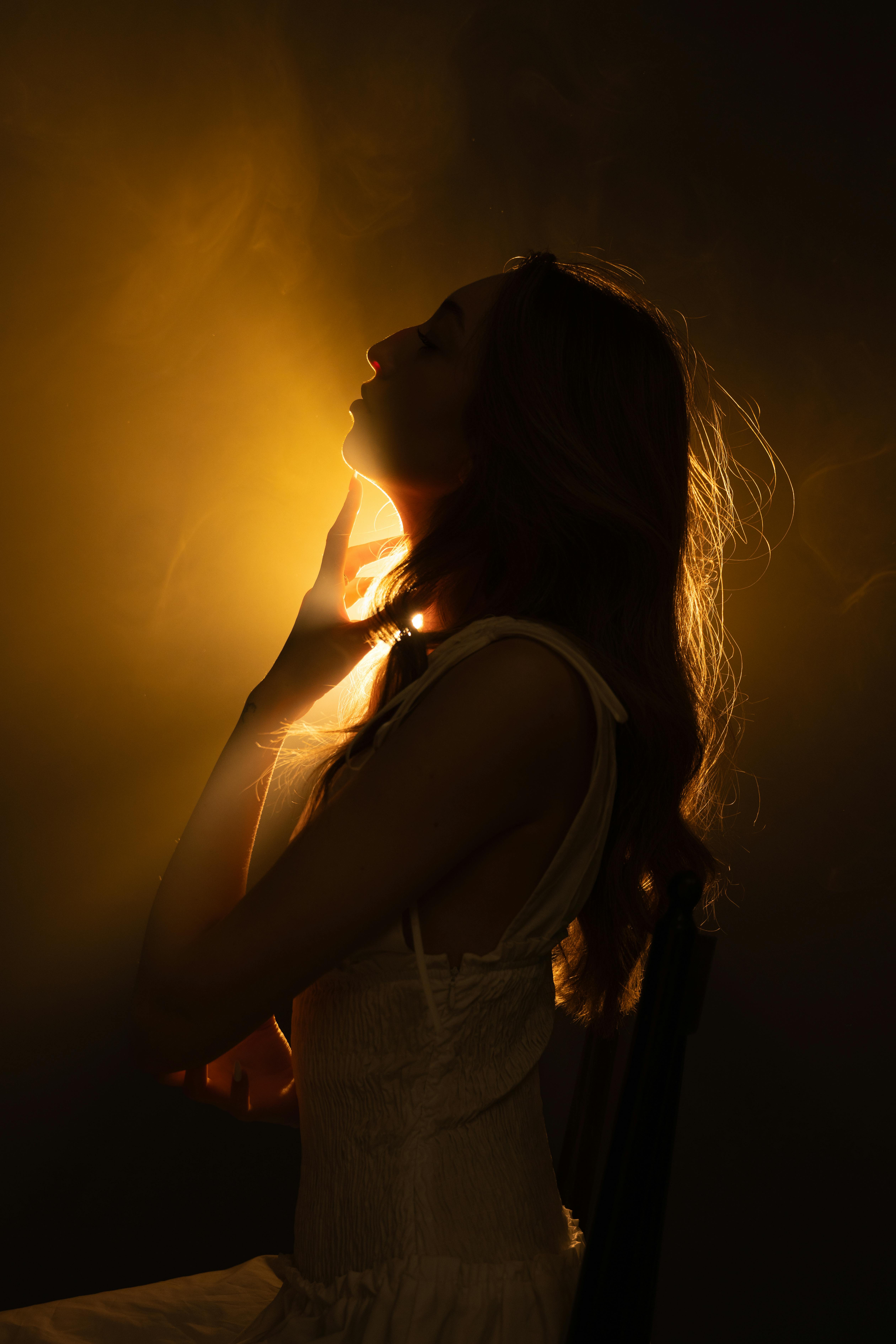 Young woman laying down on floor · Free Stock Photo