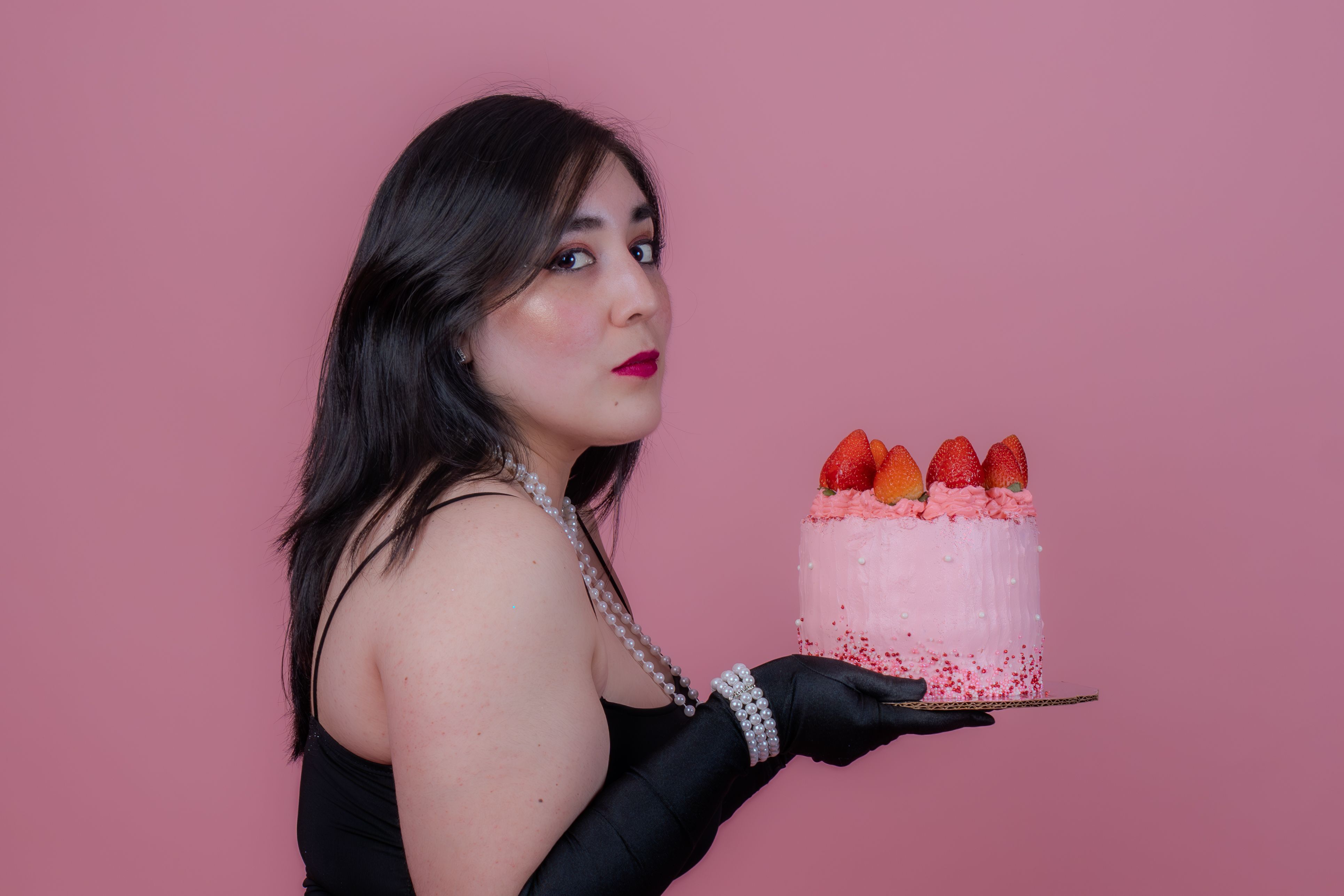 Elegant Woman with Pink Cake Portrait · Free Stock Photo